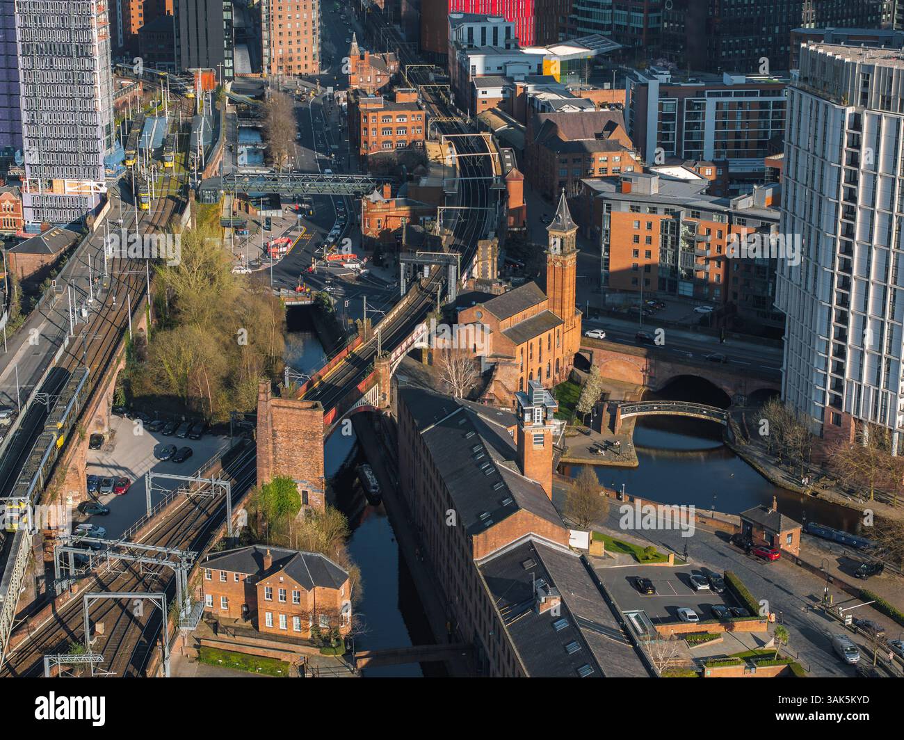 Aerial View of Manchester, UK, Featuring Canals and High Rise Buildings ...