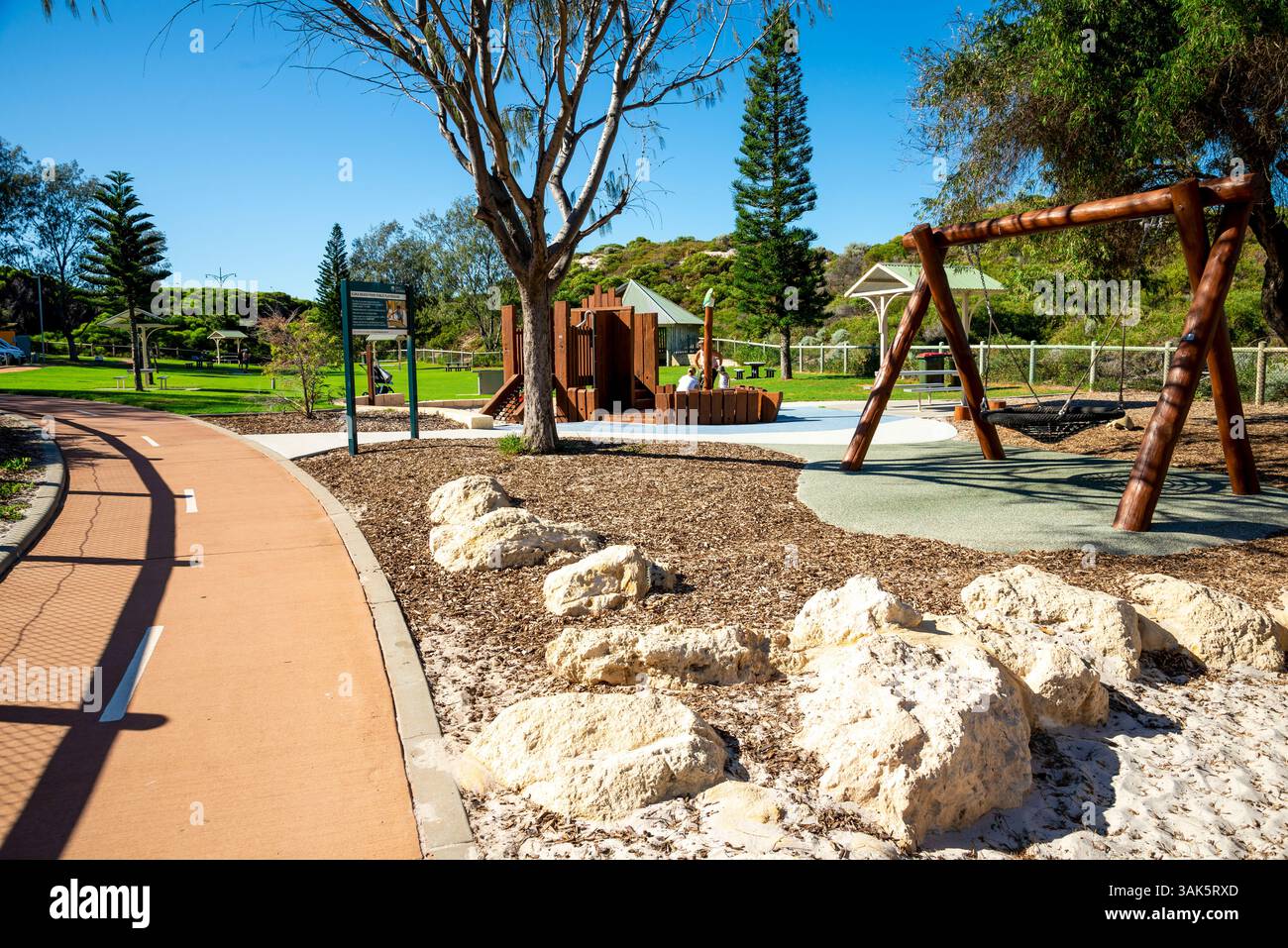 Outdoor Day at Park Playground with Trees, Rocks, and Recreation Area ...