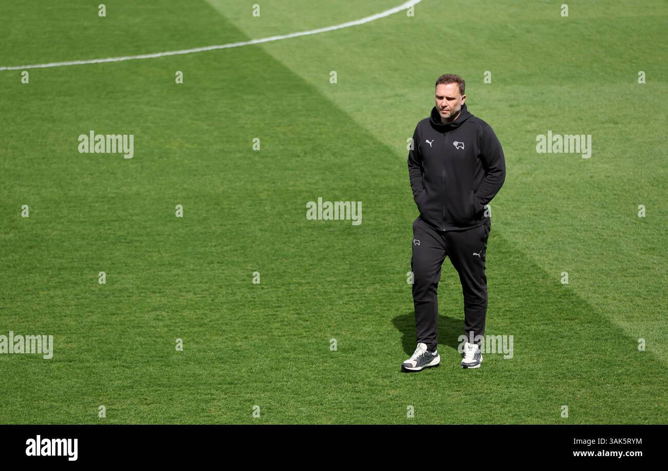 Derby County manager John Eustace inspects the pitch before the Sky Bet ...