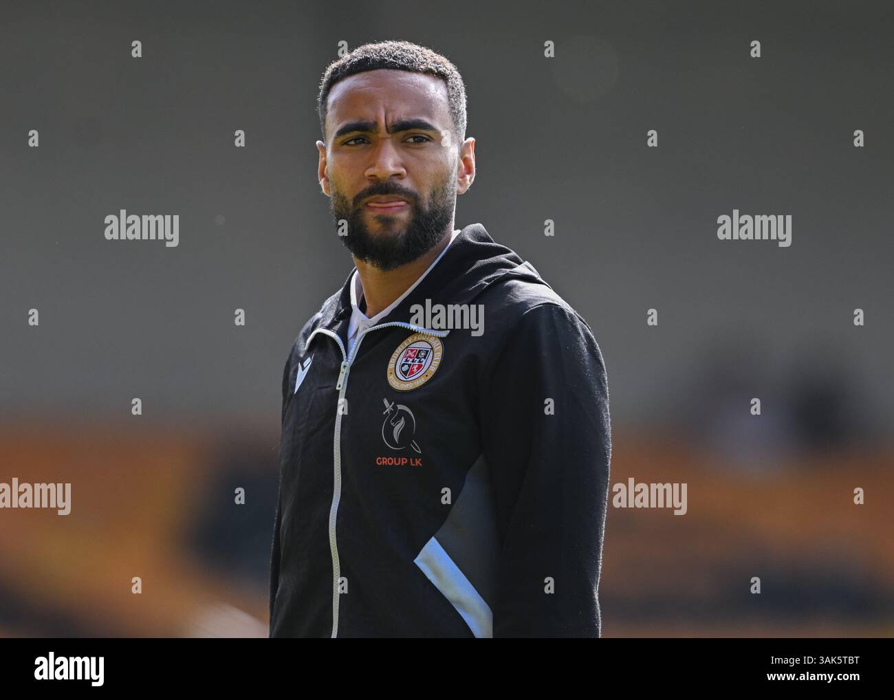 Bromley's Ashley Charles inspects the pitch ahead of the Sky Bet League ...