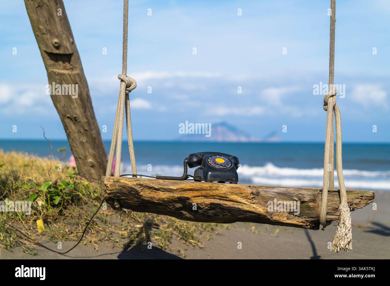 A gentle spring morning in Yilan, Taiwan, features a rotary phone on a ...