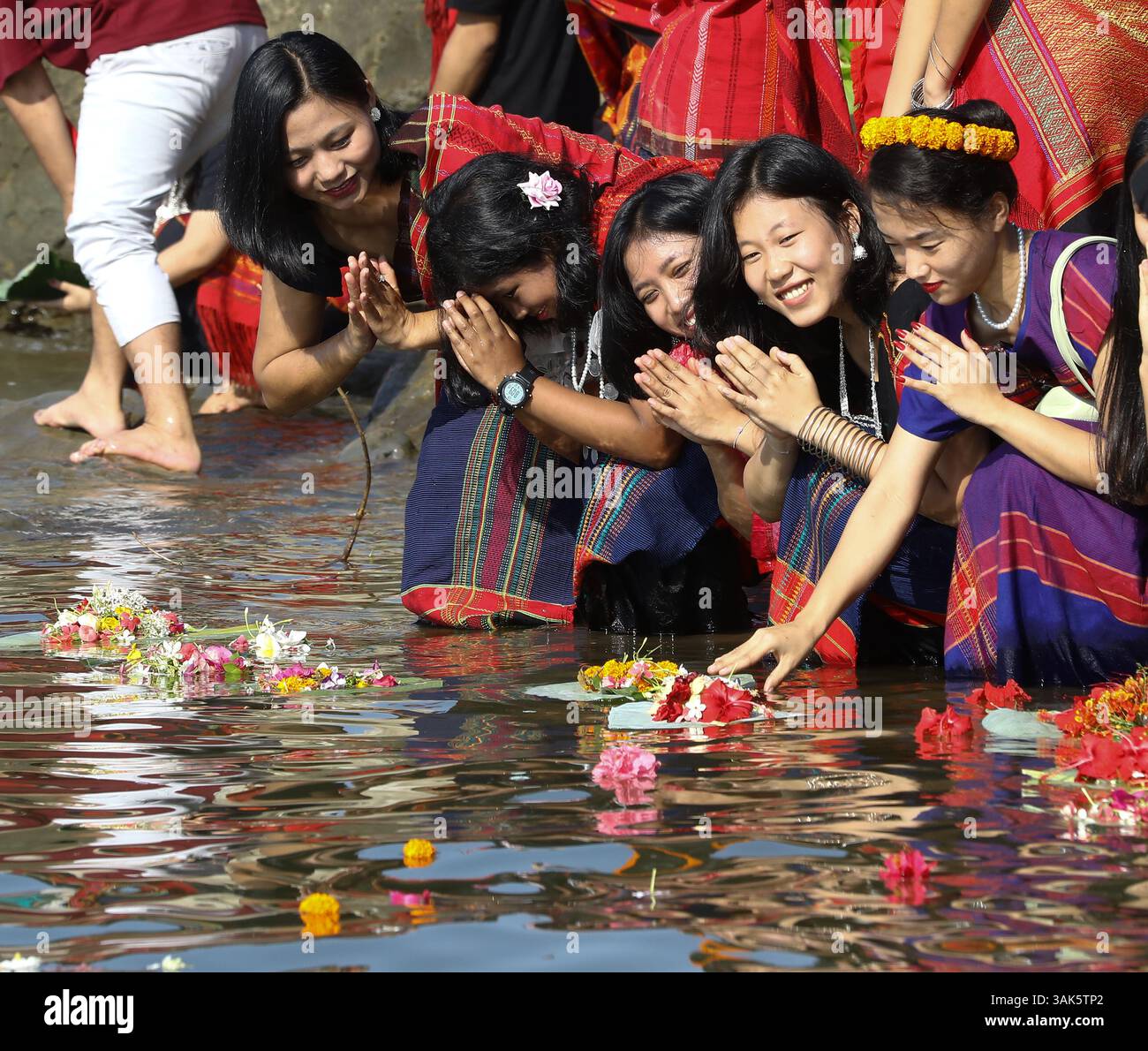 Phul bizu Chakma people of RANGAMATI wake early, clean their houses, decorate them with flowers ...