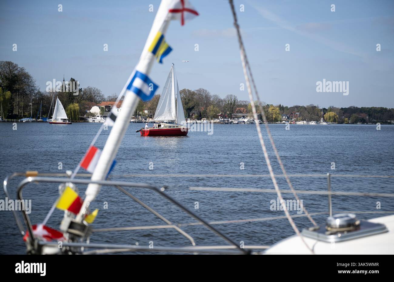 Zeuthen, Germany. 12th Apr, 2025. A boat sails on Lake Zeuthen. This ...