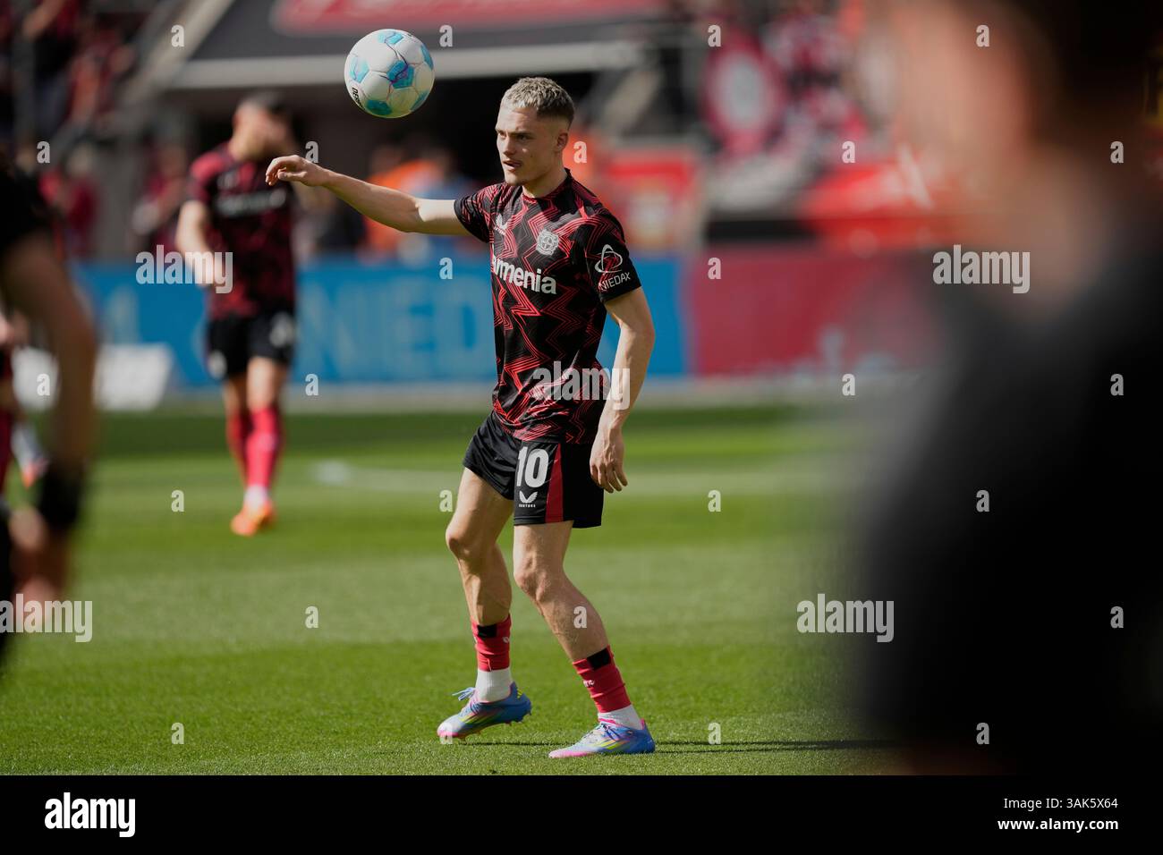 Leverkusen's Florian Wirtz warms up prior to the German Bundesliga ...