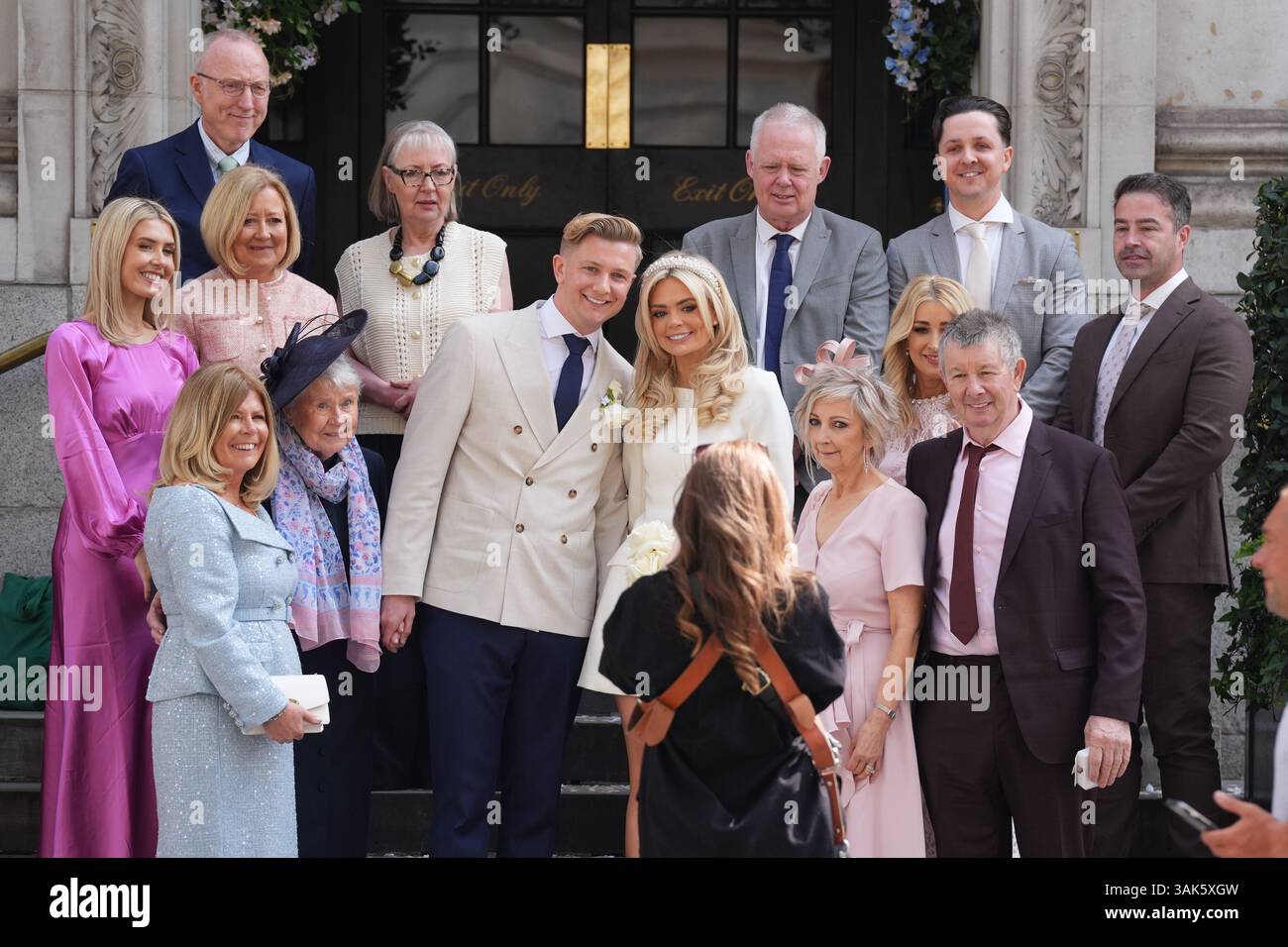 News broadcaster Ellie Costello and her new husband Gerard Durkan pose ...