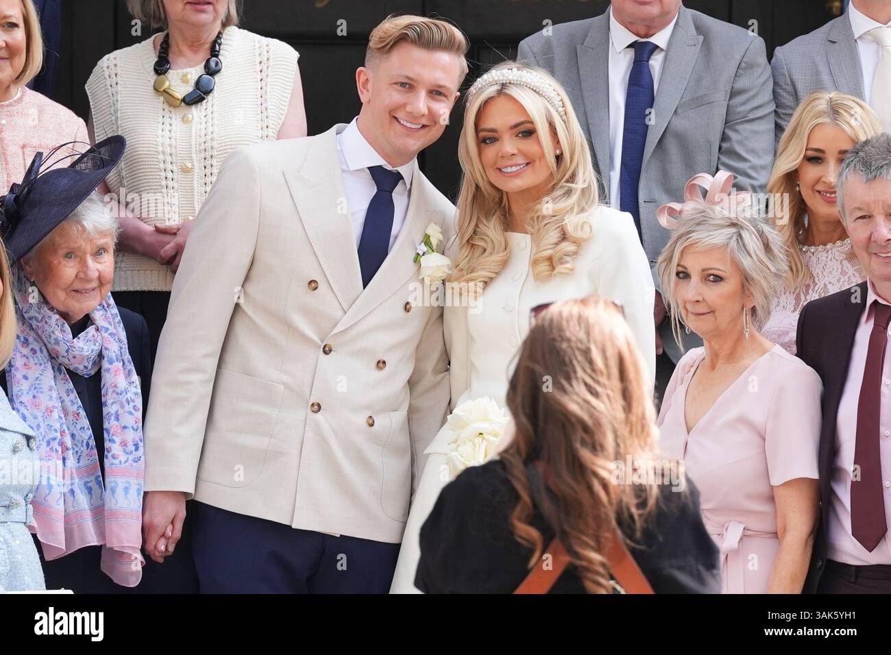 News broadcaster Ellie Costello and her new husband Gerard Durkan pose ...