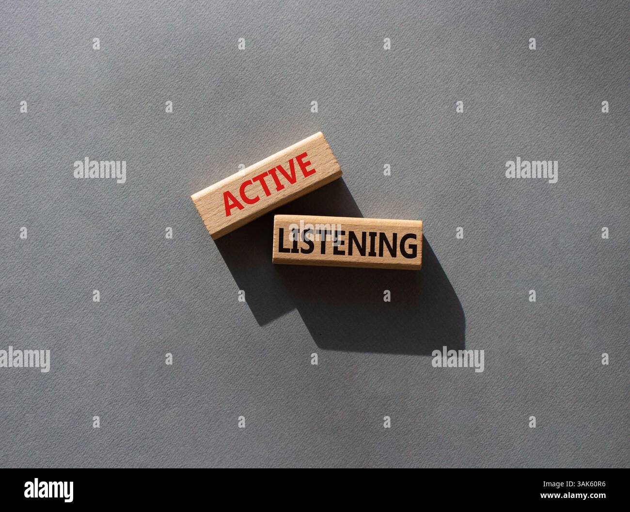Active listening symbol. Wooden blocks with words Active listening ...