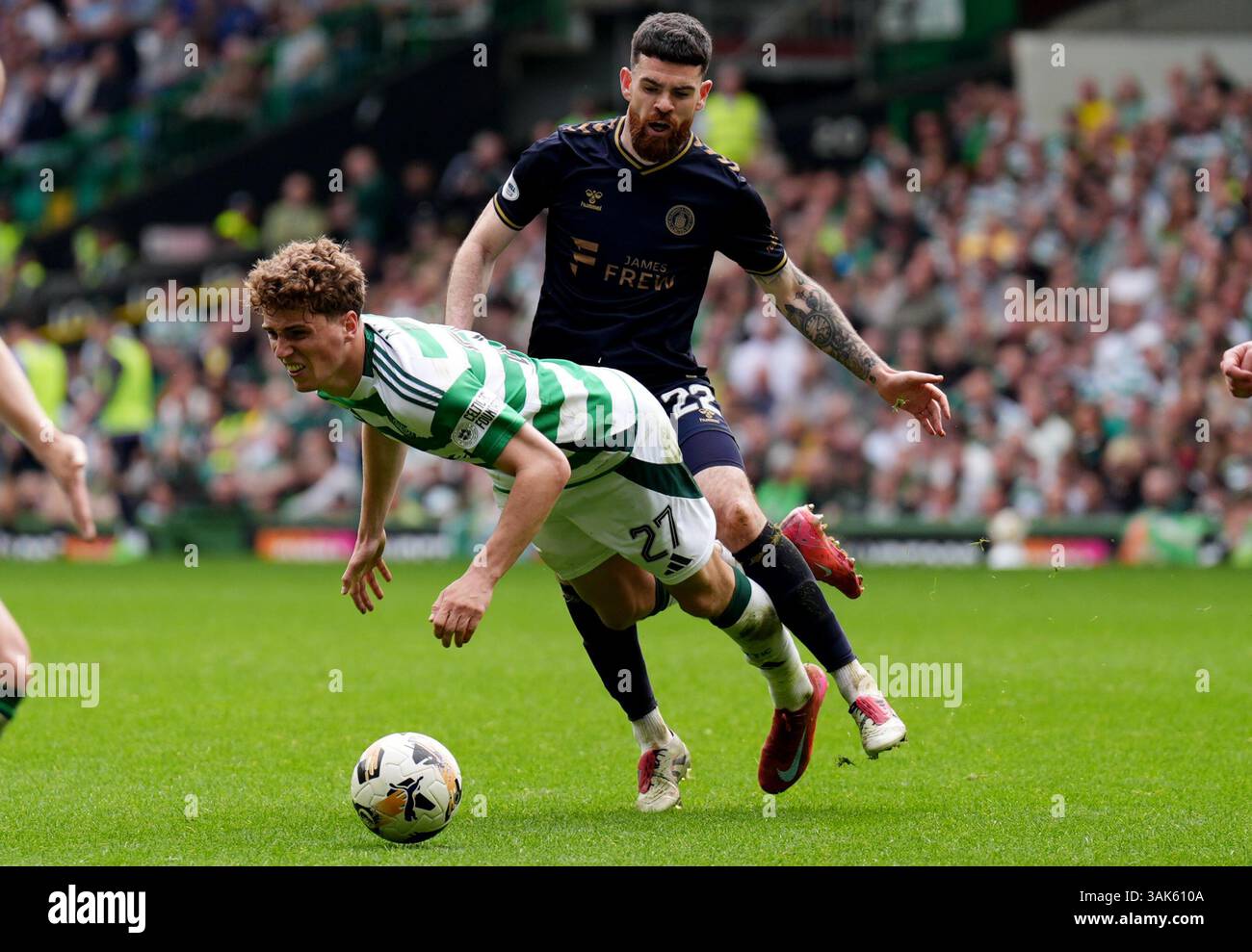 Celtic's Arne Engels (left) and Kilmarnock's Liam Donnelly battle for ...