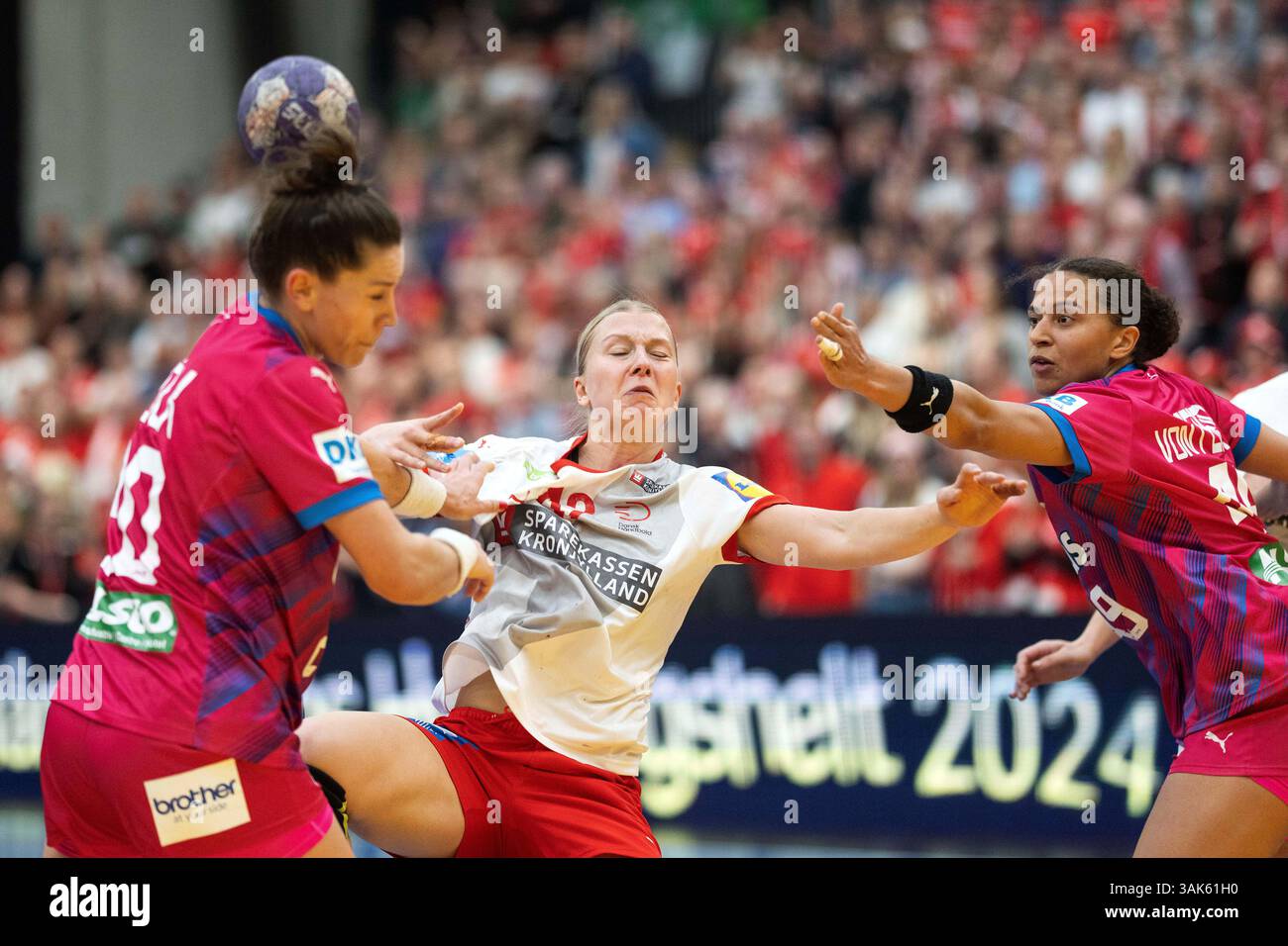 Denmark's Michala Moeller is challenged by Germany's Emily Bölk, left ...