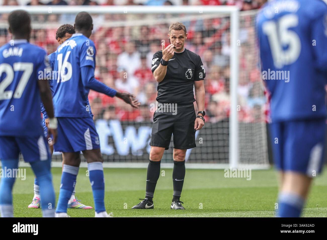 Nottingham, UK. 12th Apr, 2025. Referee Craig Pawson gives instructions during the Premier ...