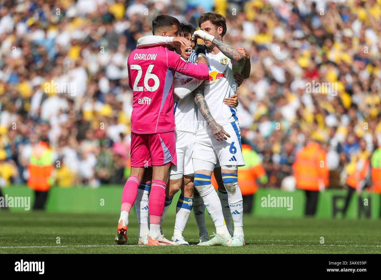 Karl Darlow of Leeds United, Joe Rodon of Leeds United & Ao Tanaka of ...