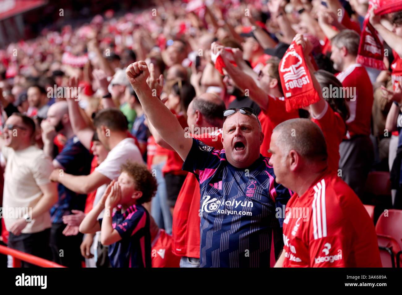 Nottingham Forest fans singing in the stands during the Premier League ...