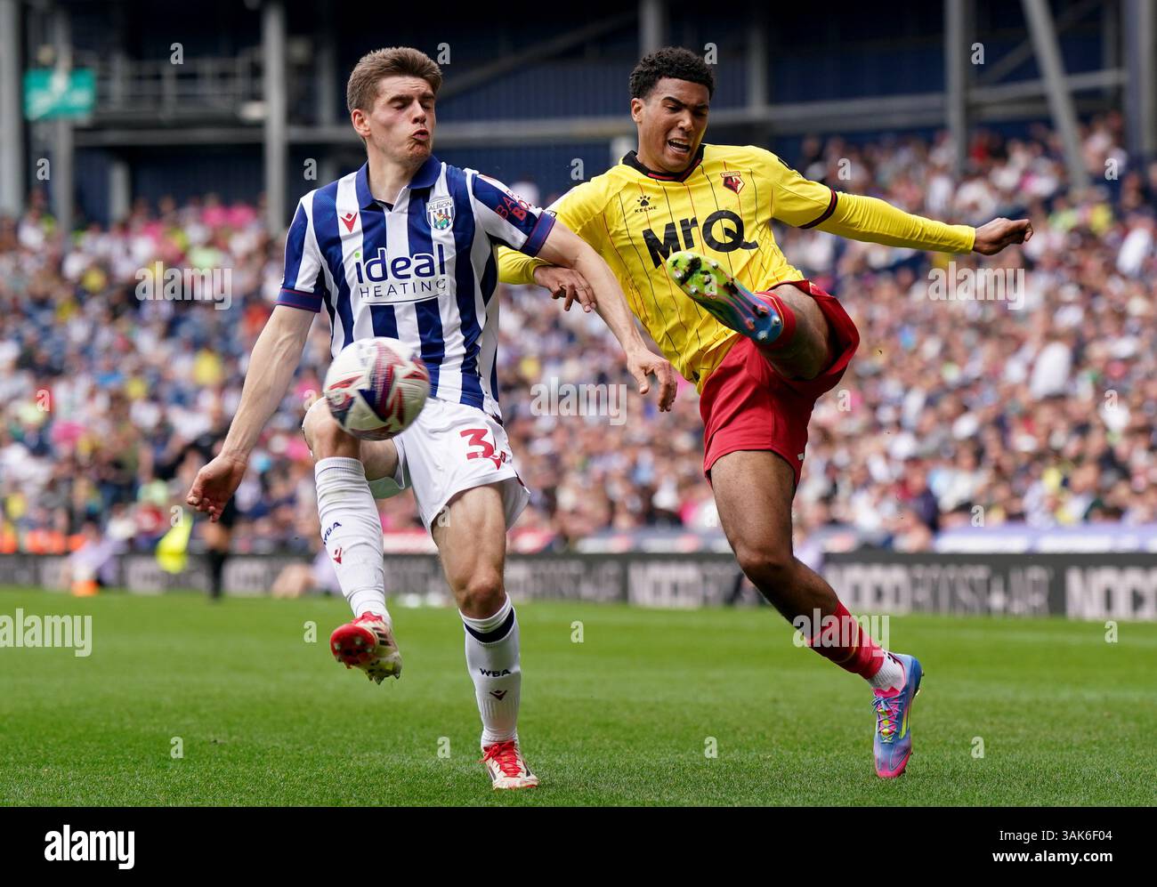 West Bromwich Albion's Tom Fellows (left) and Watford's Caleb Wiley ...