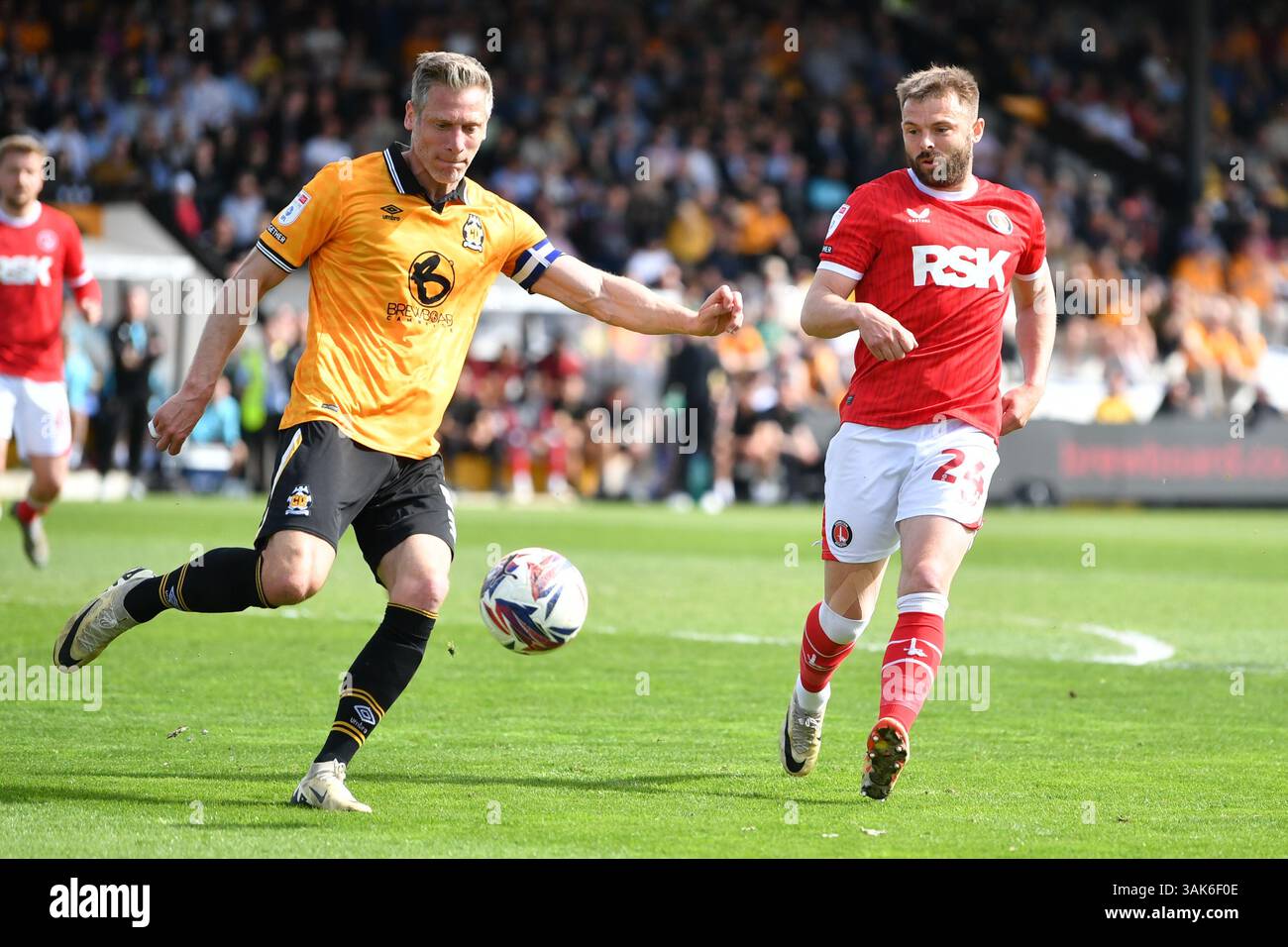 Cambridge, England. 12th Apr 2025. Michael Morrison and Matty Godden during the Sky Bet EFL ...