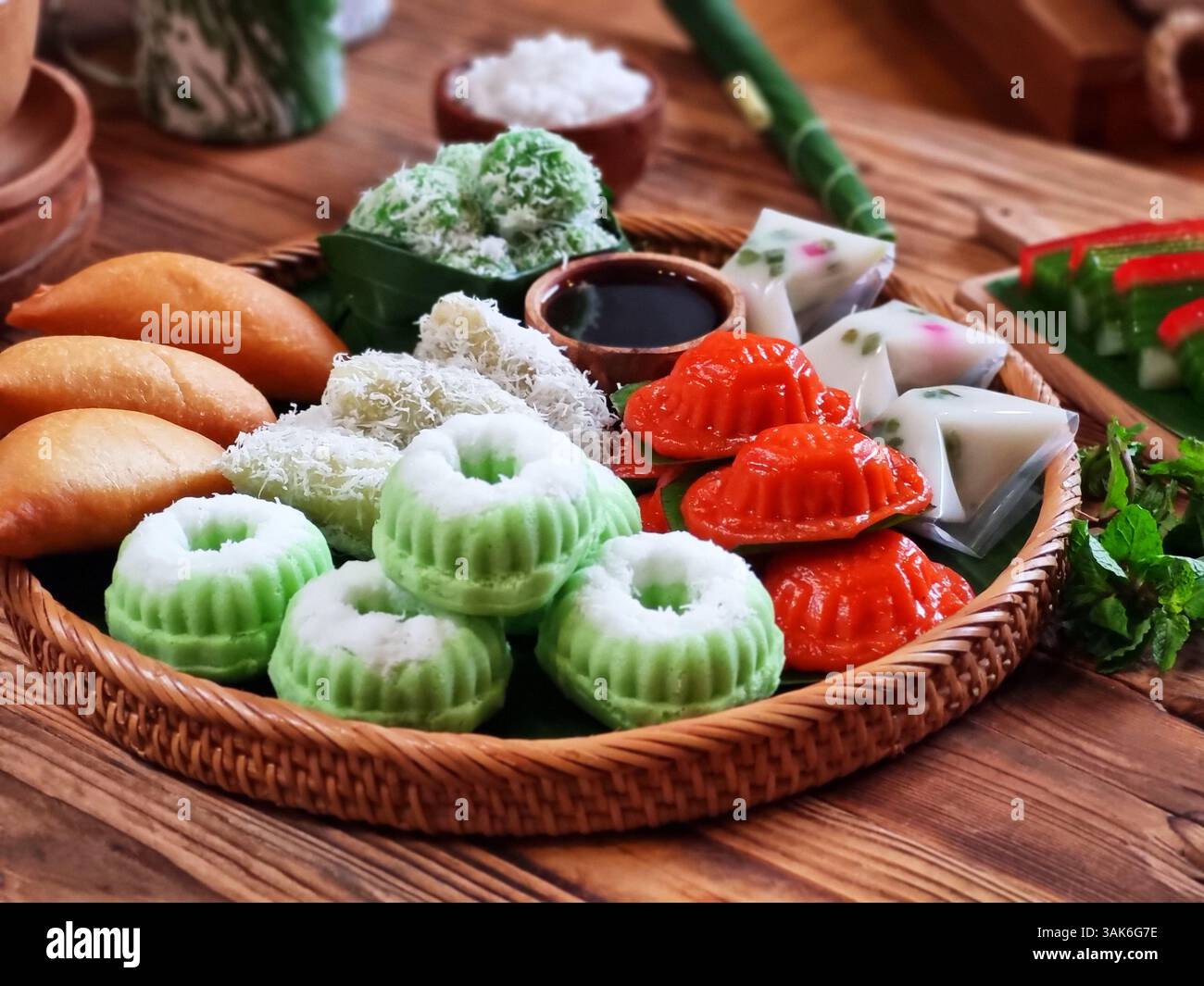 Colorful traditional Indonesian cakes, also known as 'kue basah', are ...