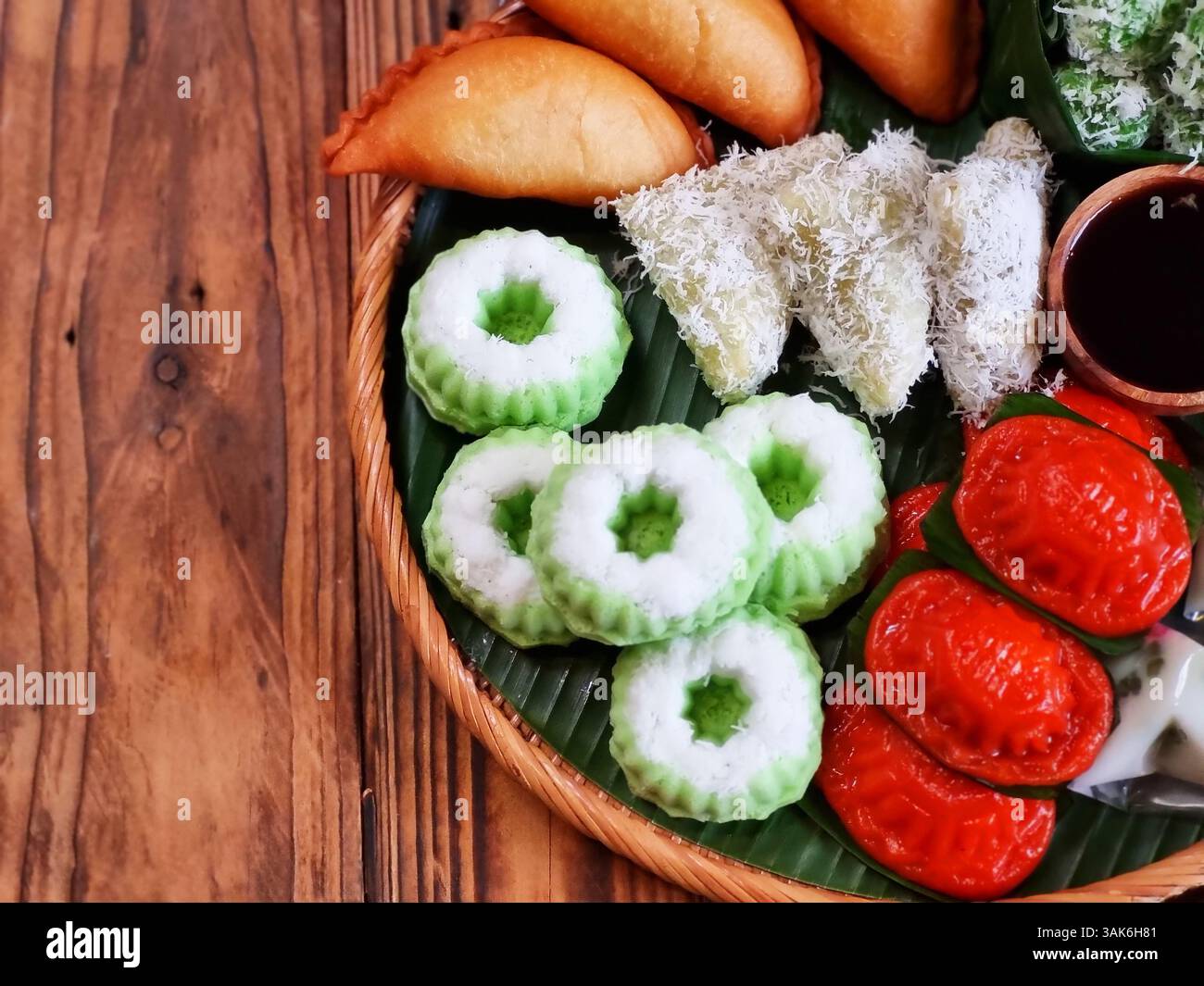 Colorful traditional Indonesian cakes, also known as 'kue basah', are ...