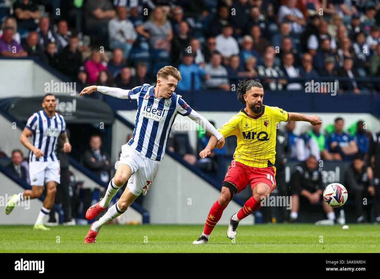 #21, Isaac Price of WBA & #10, Imran Louza of Watford fight for the ball during the Sky Bet ...