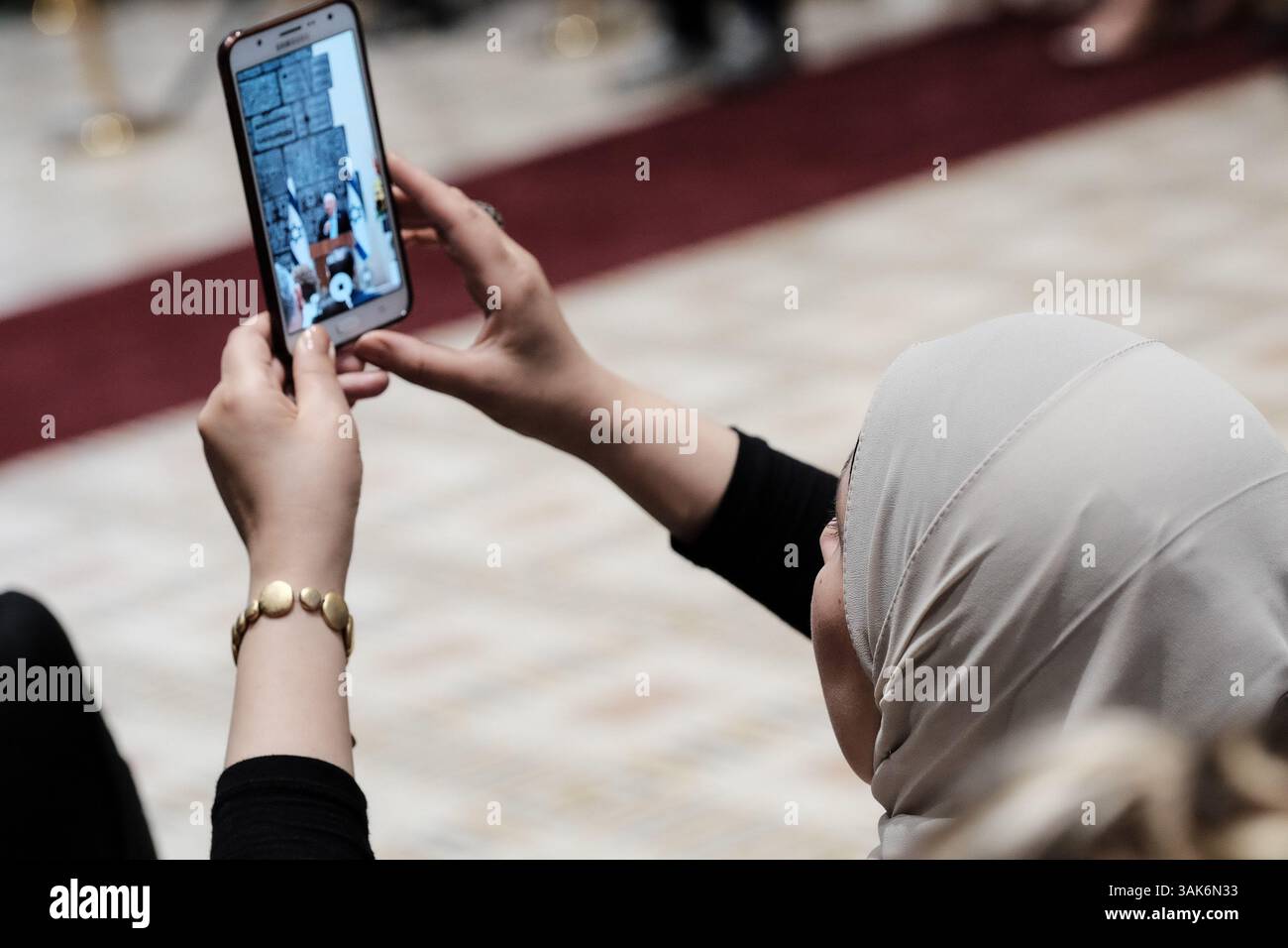 May 15, 2017 - Jerusalem, Israel - A woman wearing a hijab videographs ...