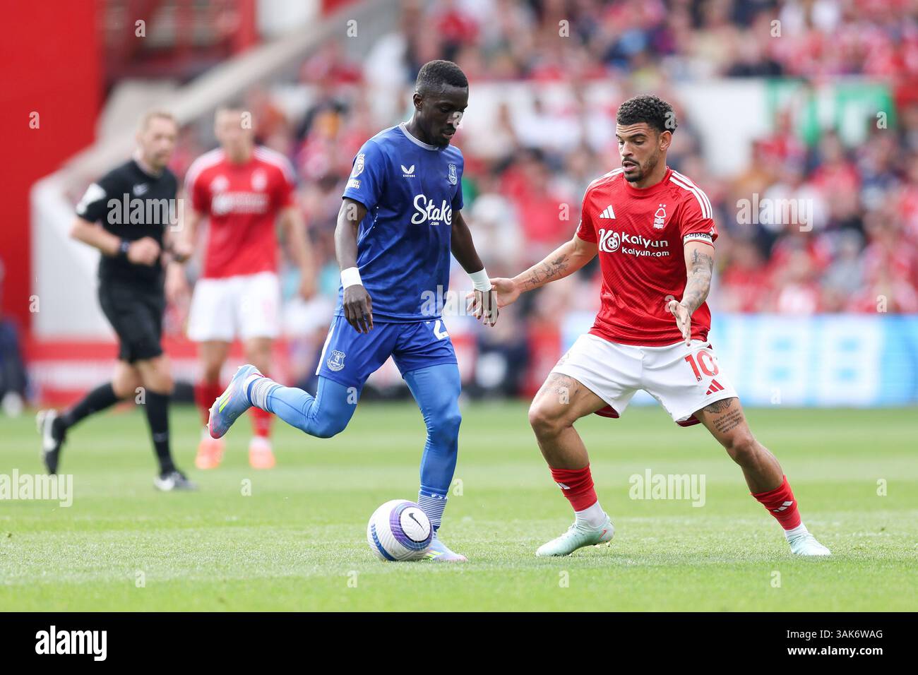 Nottingham, England, 12th April 2025. Idrissa Gueye of Everton passes ...