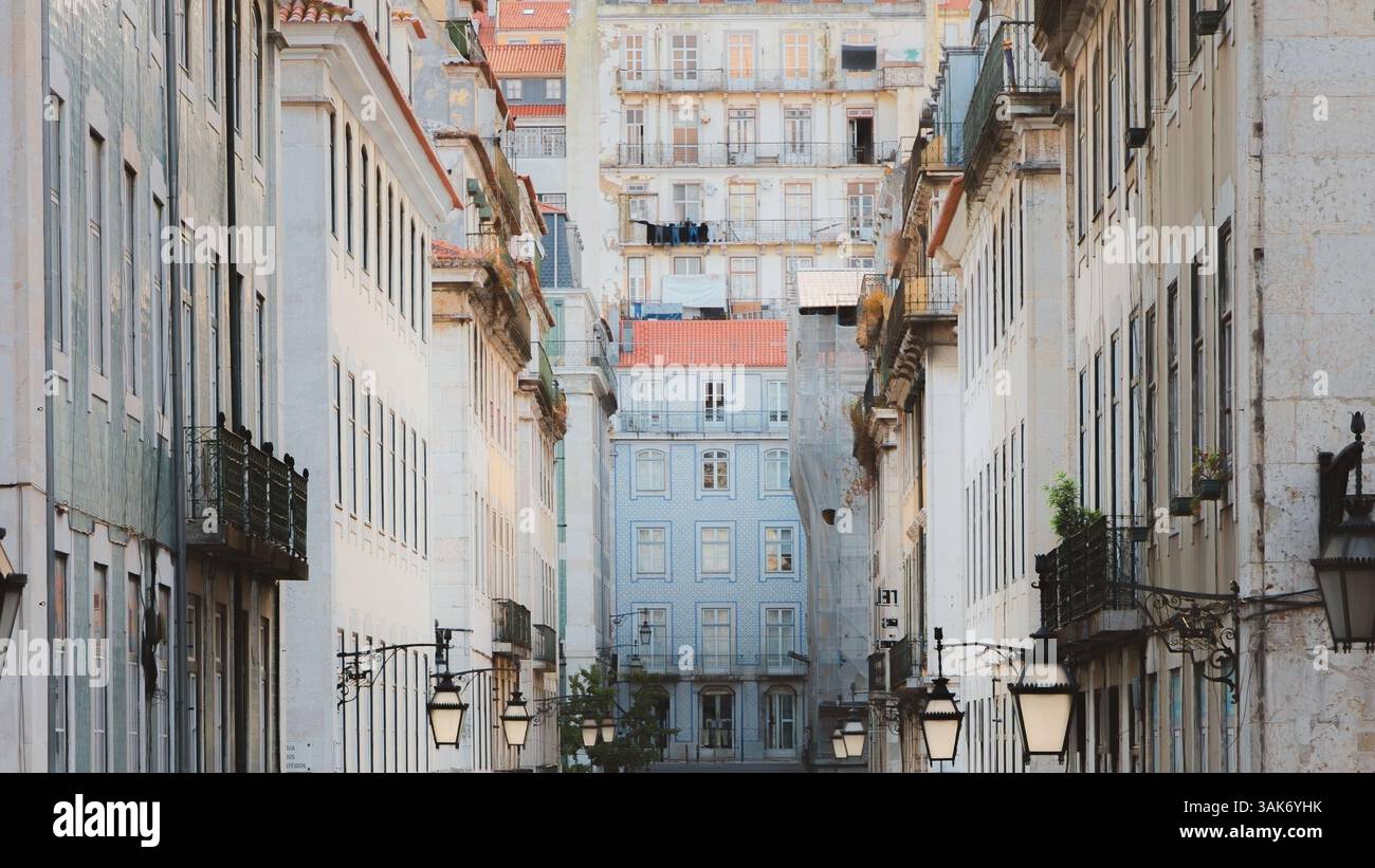 Historic apartment buildings with charming facades line a quiet street ...