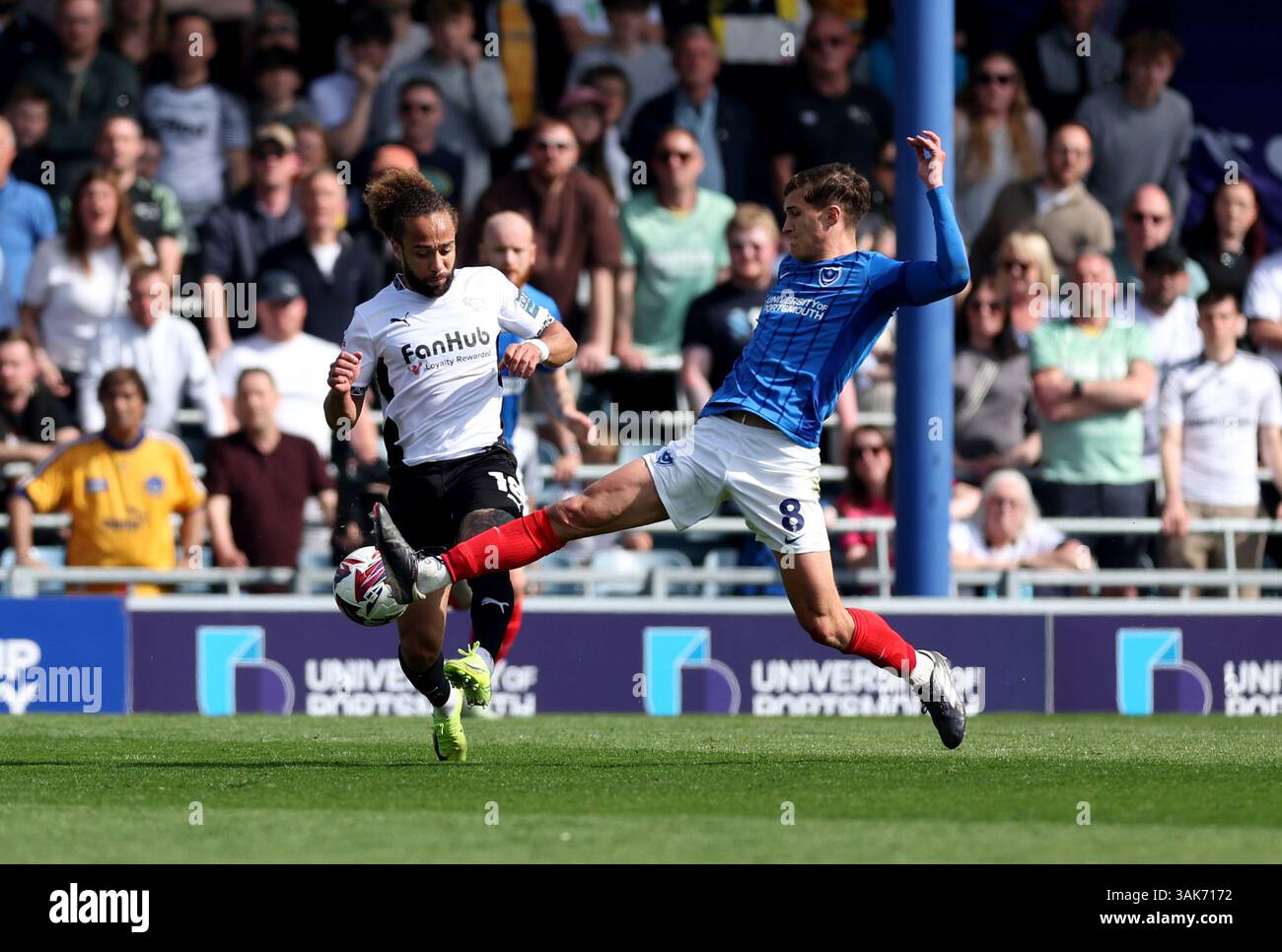 Derby County's Marcus Harness (left) and Portsmouth's Freddie Potts ...