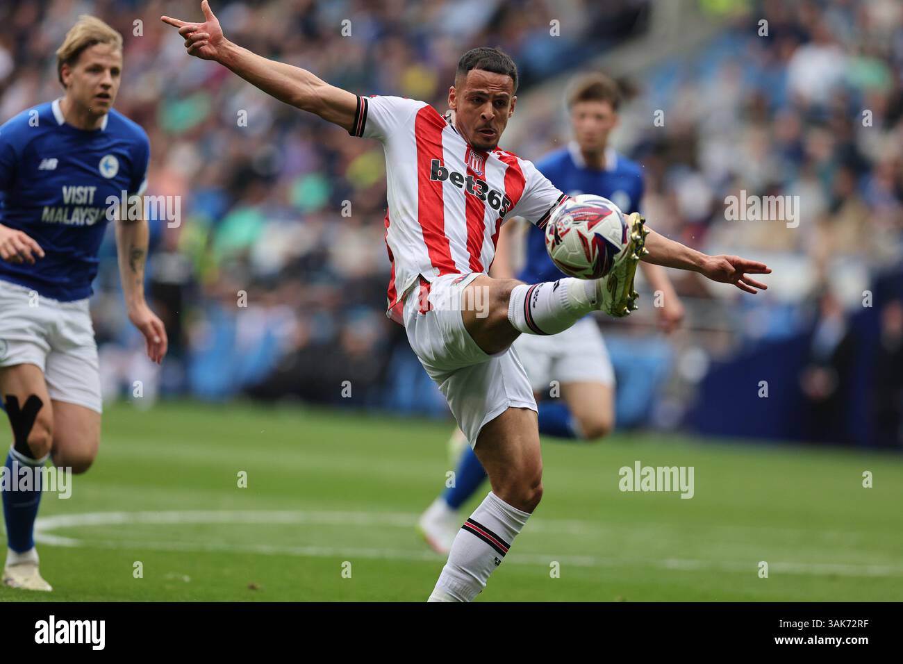 Cardiff, UK. 12th Apr, 2025. Ali Al-Hamadi of Stoke City in action. EFL ...