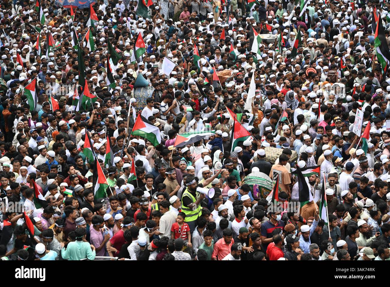 People participate in a demonstration titled "March for Gaza" during a rally to expressing ...