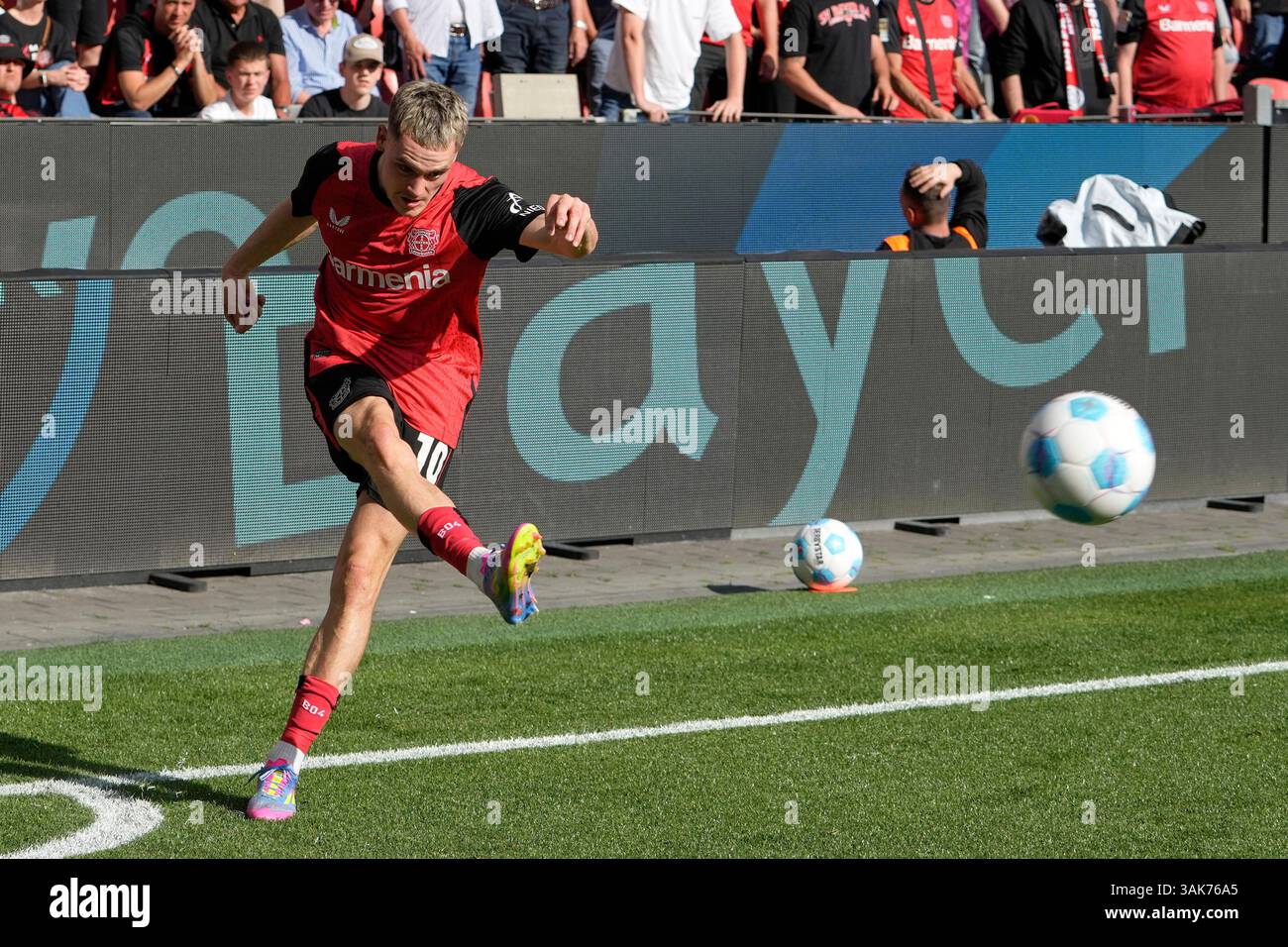 Leverkusen's Florian Wirtz kicks the ball during the German Bundesliga ...