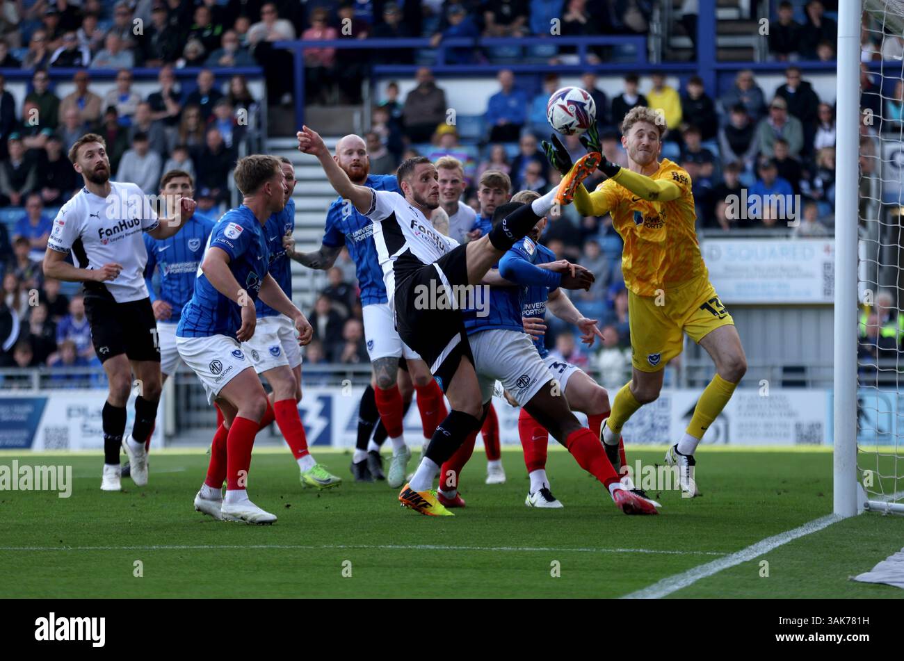 Portsmouth goalkeeper Nicolas Schmid makes a save during the Sky Bet ...