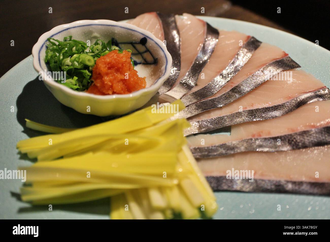 Japanese cuisine: sawara (Japanese Spanish mackerel) and yellow chive ...