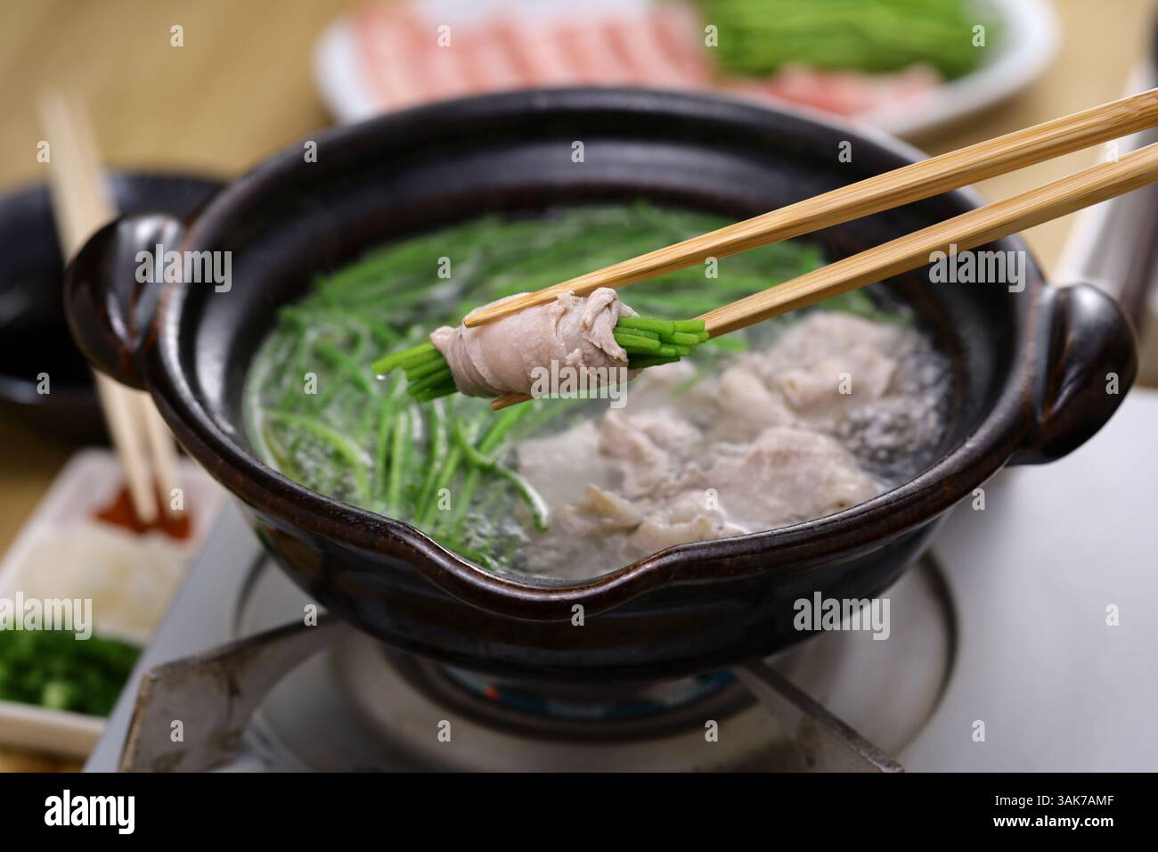 white water snowflake stems and pork belly shabu-shabu, hot pot dish ...