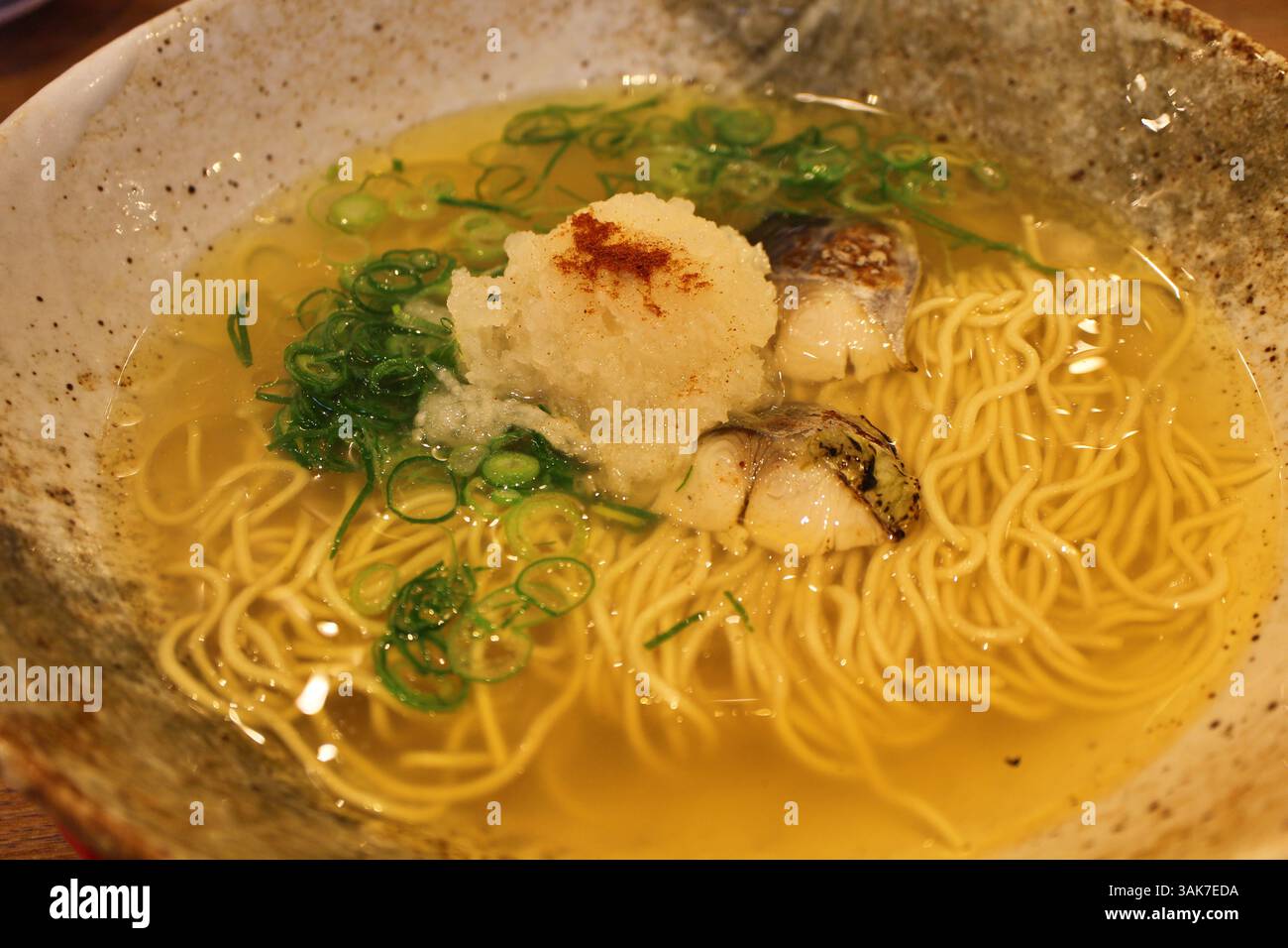 Sawara (Japanese Spanish mackerel) ramen with grated daikon radish in ...