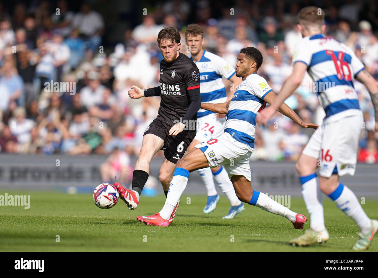 Jonathan Varane of Queens Park Rangers attempts to intercept Max Bird ...