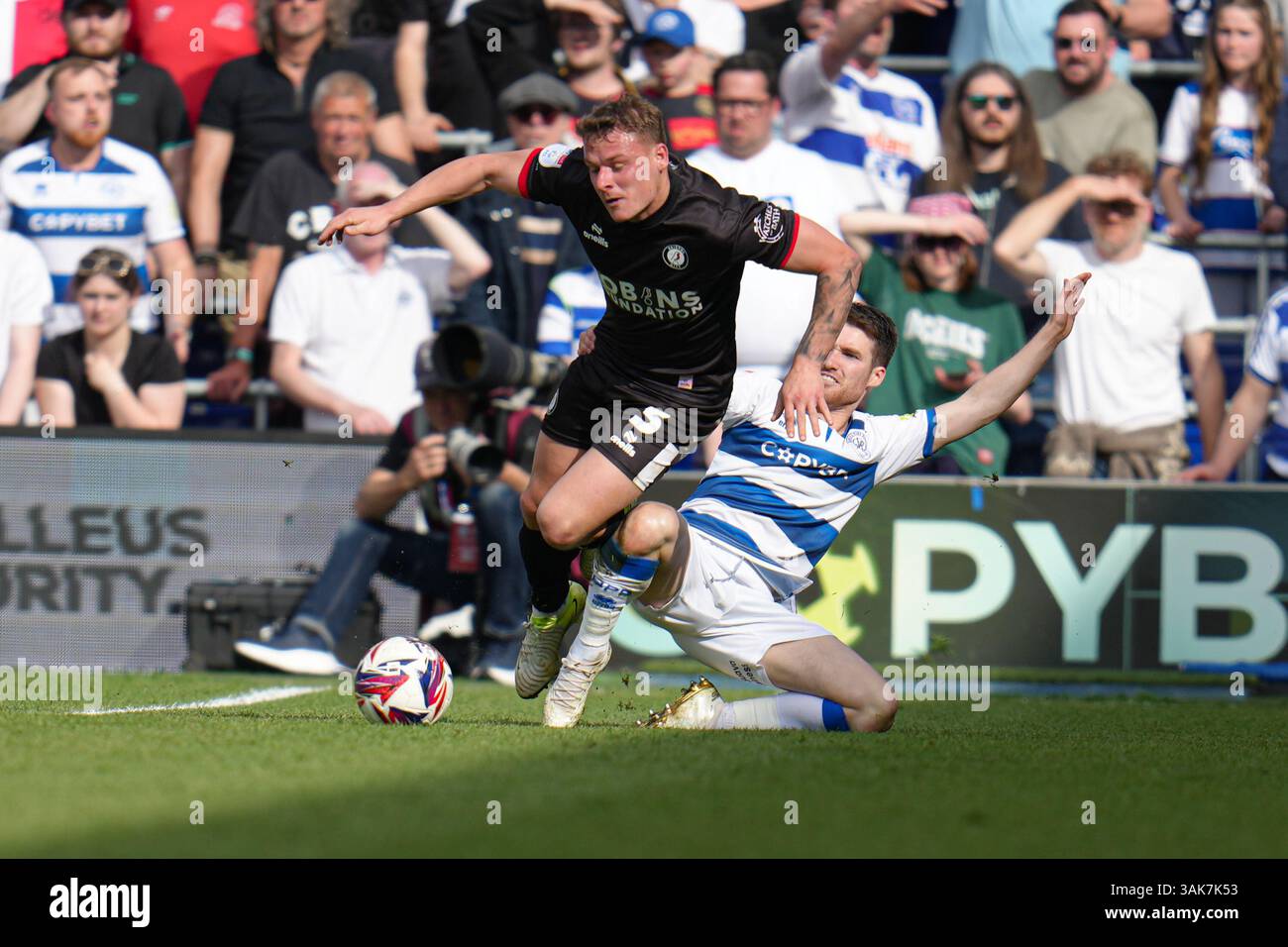 Paul Smyth of Queens Park Rangers fouls Cameron Pring of Bristol City ...