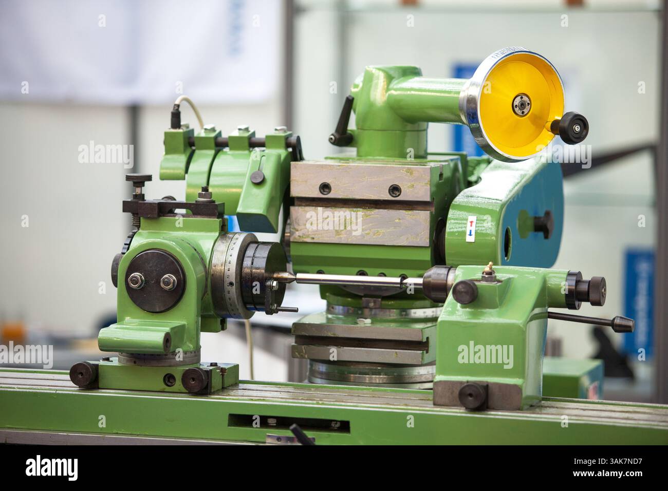 Green industrial precision grinding machine with rotating abrasive ...