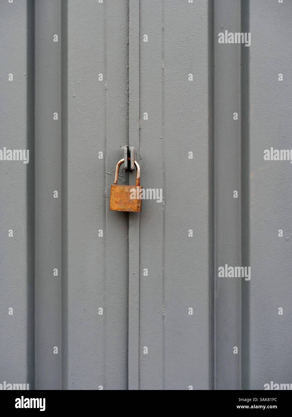Old Gray Painted Gate Made of Trapezoidal Sheet Metal Stock Photo - Alamy