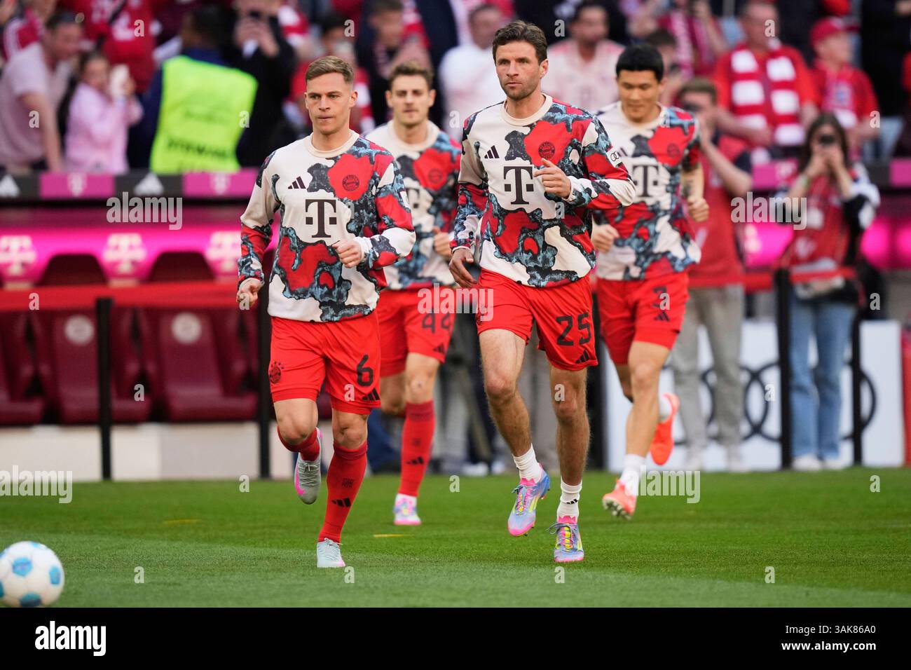 Bayern's Joshua Kimmich, Josip Stanisic, Thomas Mueller, Kim Min-jae ...