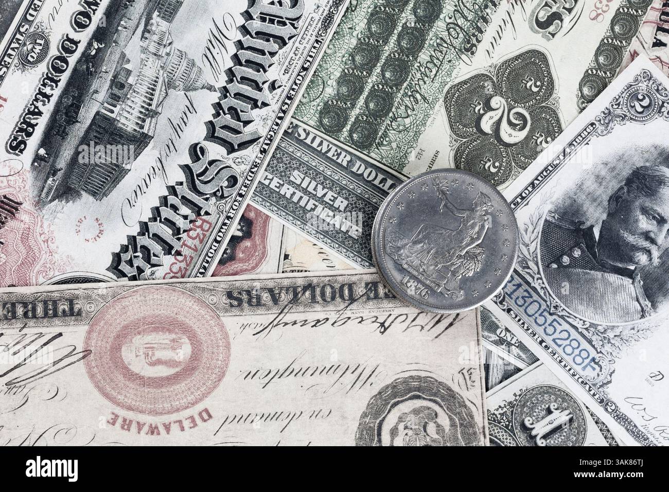 Greenback US paper dollars and silver certificates with silver dollar ...