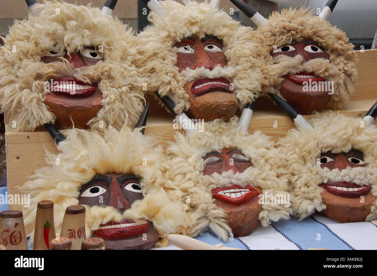 Traditional Hungarian "busó" masks and dolls made of wood and sheep ...