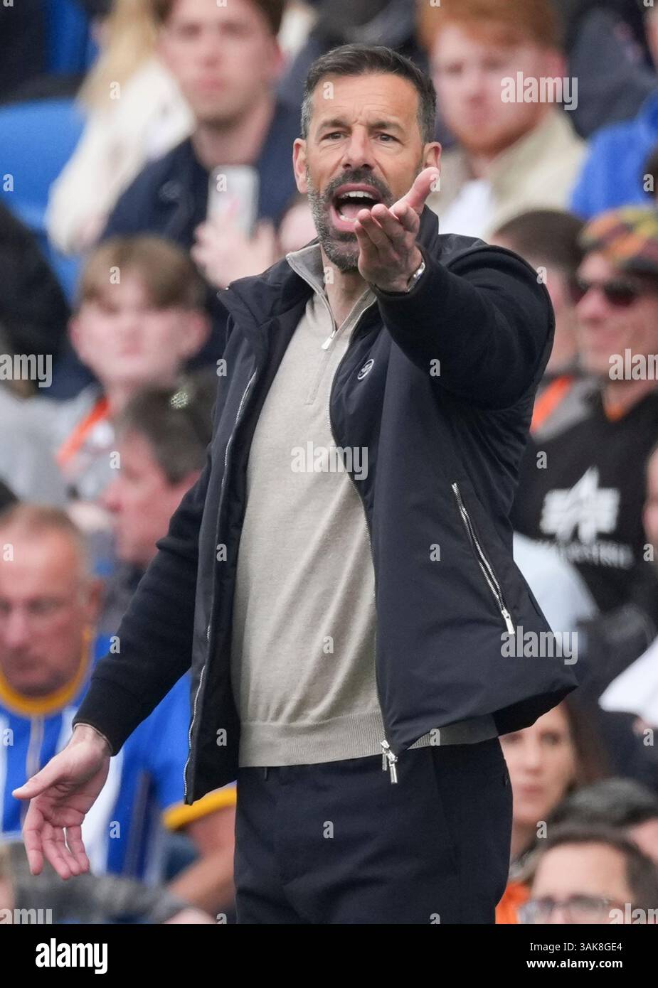 Leicester's head coach Ruud van Nistelrooy reacts during the English ...
