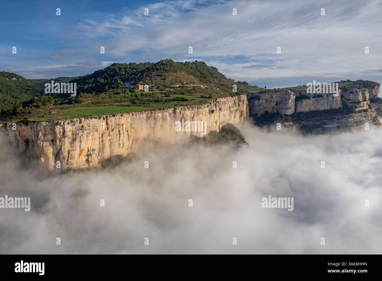 Tavertet cliffs above the fog in an aerial view of an autumn morning ...