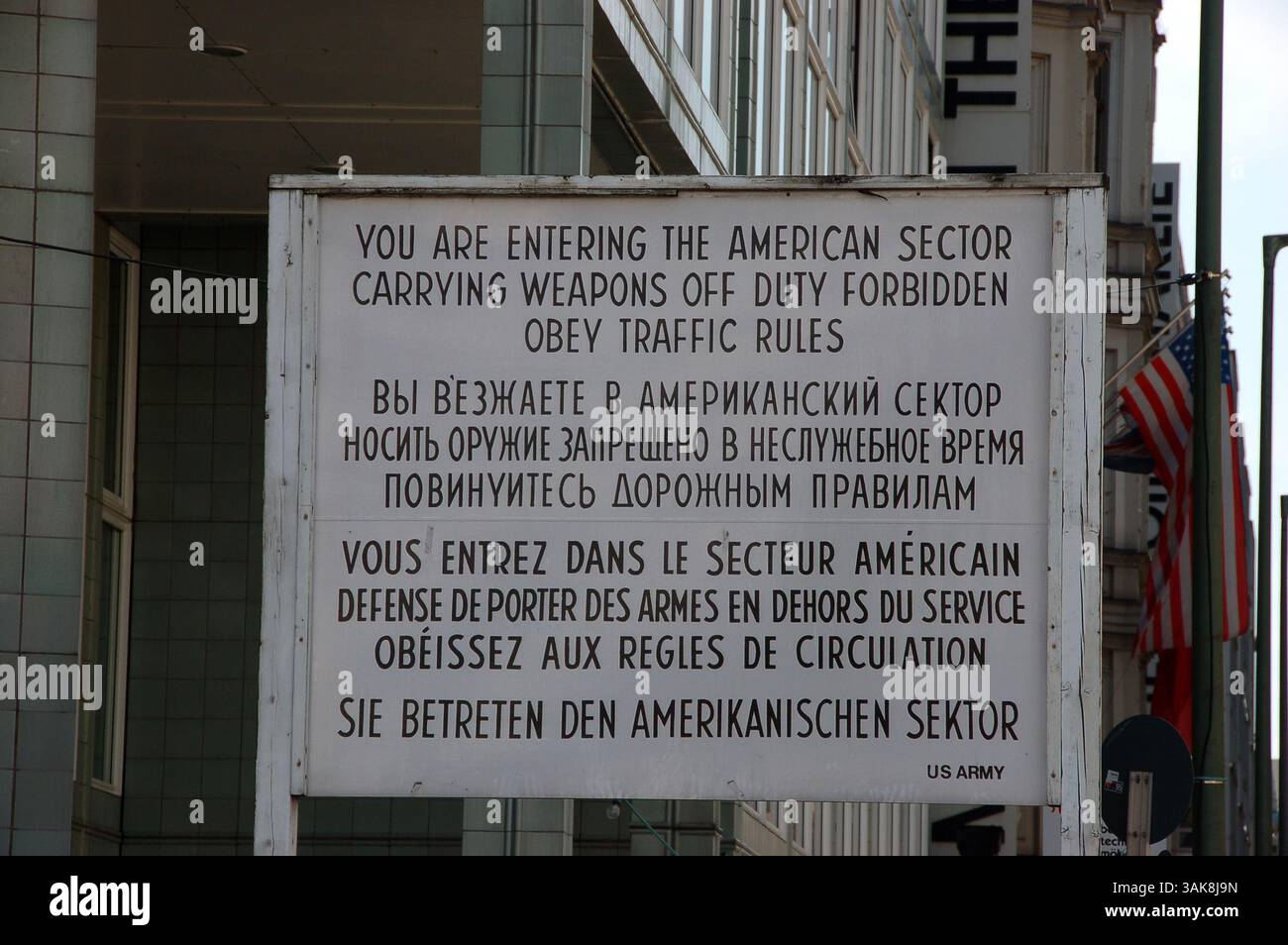 Historical multilingual sign at Checkpoint Charlie in Berlin, marking ...