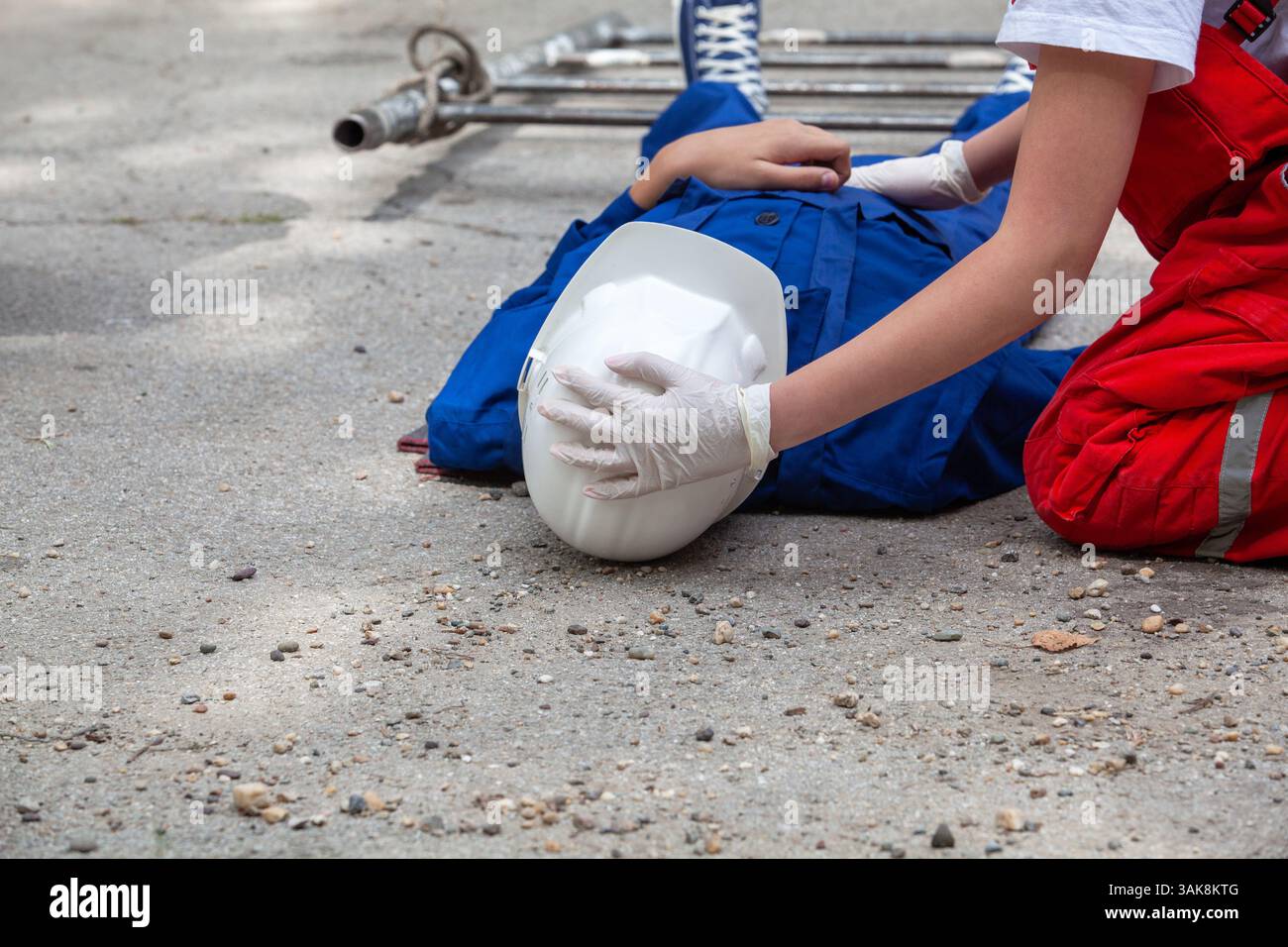 Construction worker injured on construction site receiving first aid ...