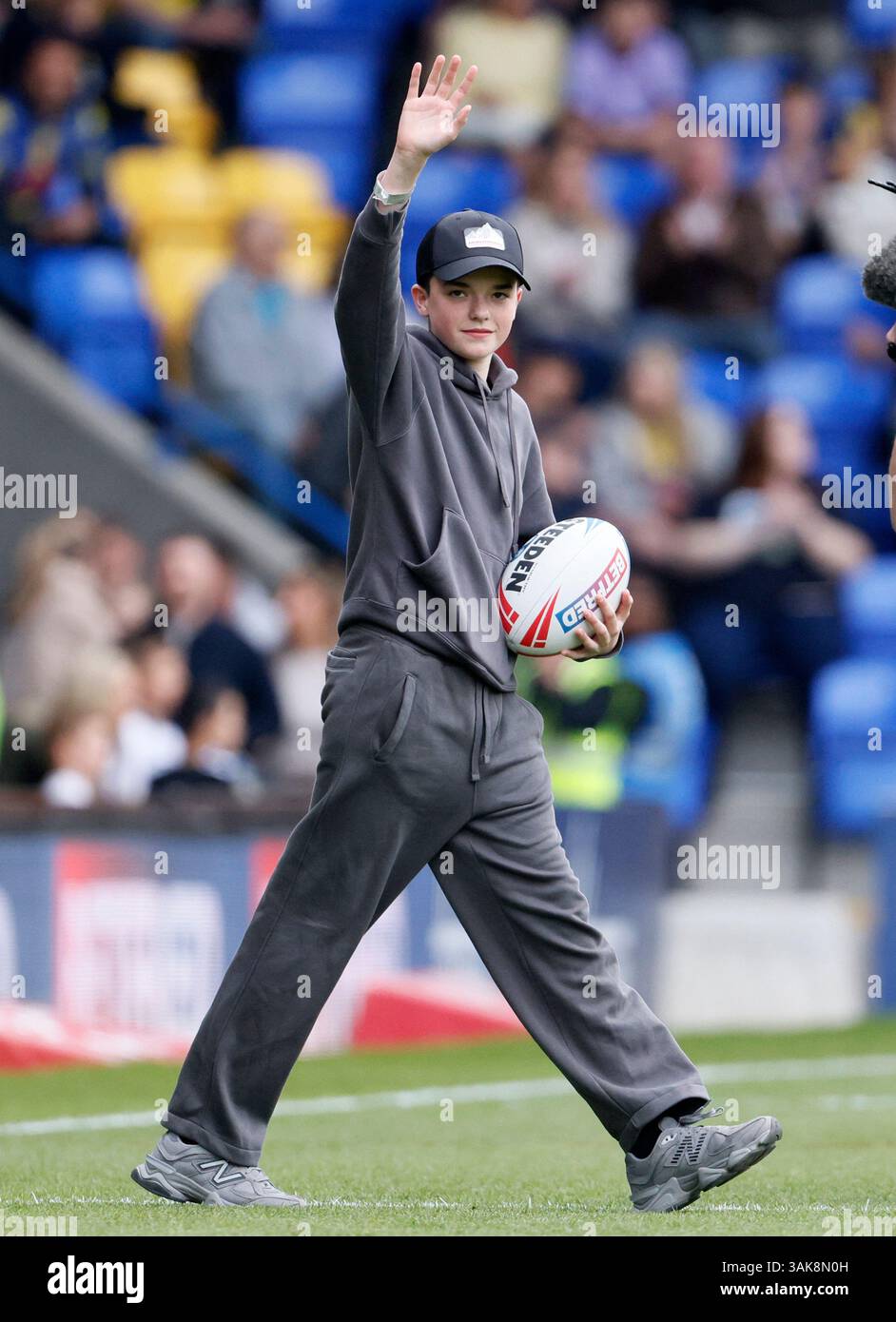Owen Cooper, who stars in TV series Adolescence, brings the match ball ...