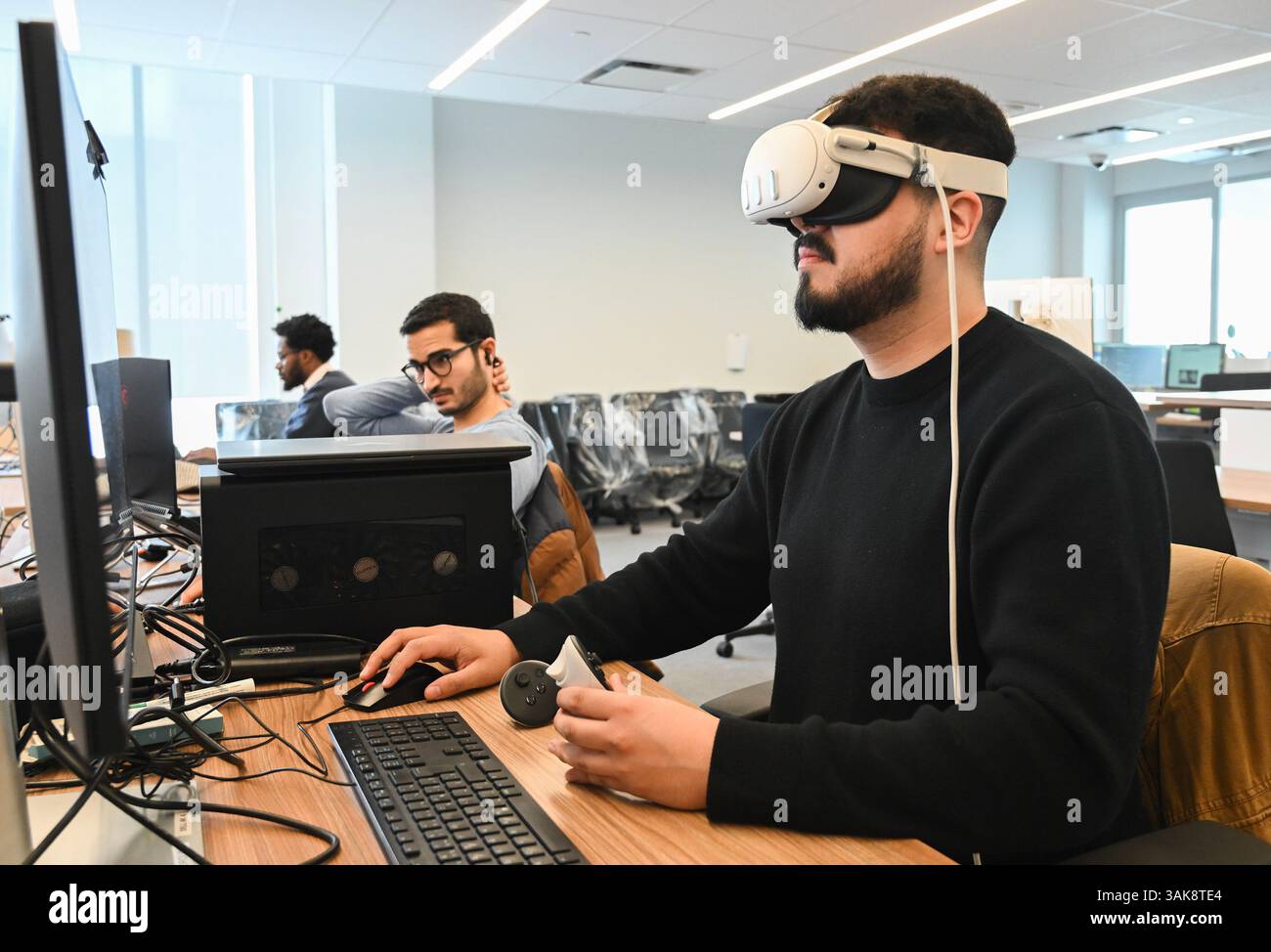 Alejandro Olivares, a master's engineering student wears a Meta Quest 3 ...