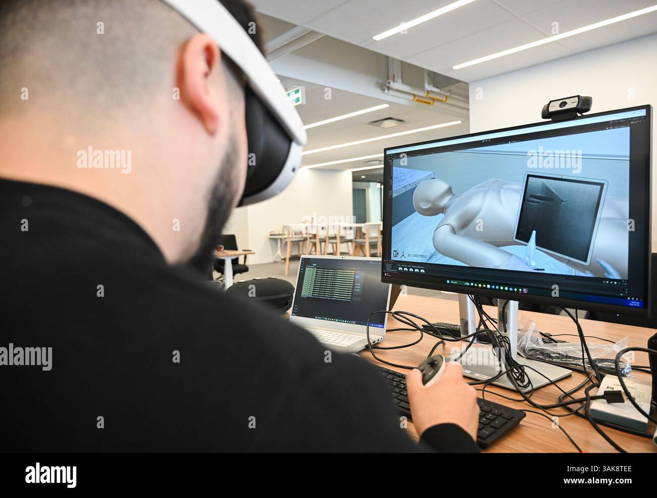 Alejandro Olivares, a master's engineering student wears a Meta Quest 3 ...