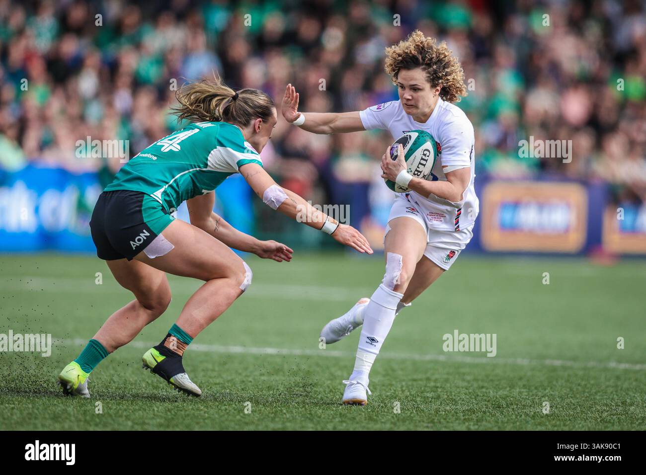 Cork, Ireland. 12 April, 2025. Ellie Kildunne of England tries to go ...