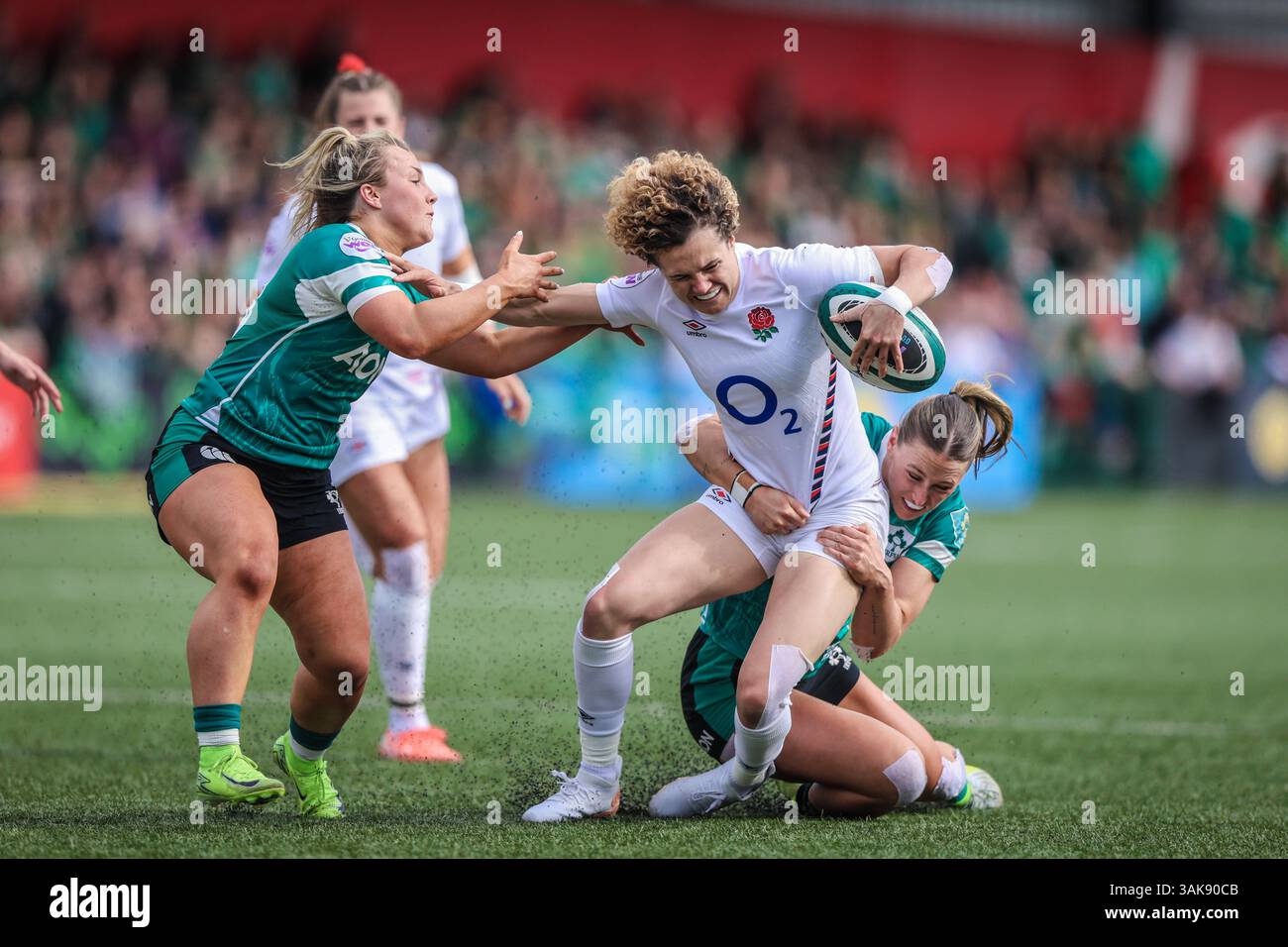 Cork, Ireland. 12 April, 2025. Ellie Kildunne of England is tackled by ...