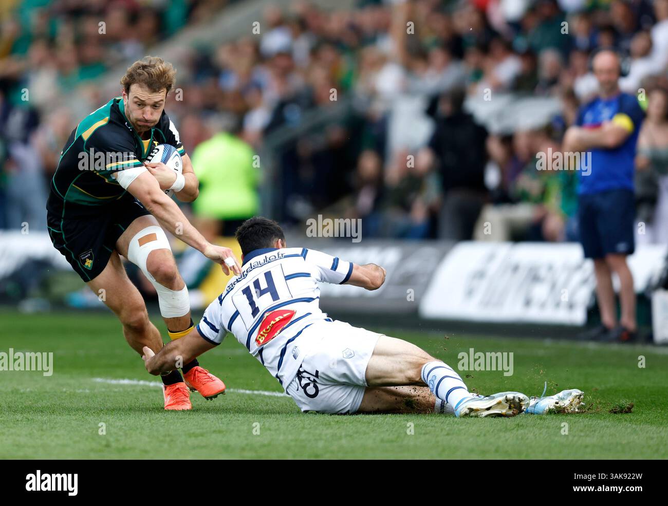 Northampton Saints' James Ramm tackled by Castres Olympique's Geoffrey ...