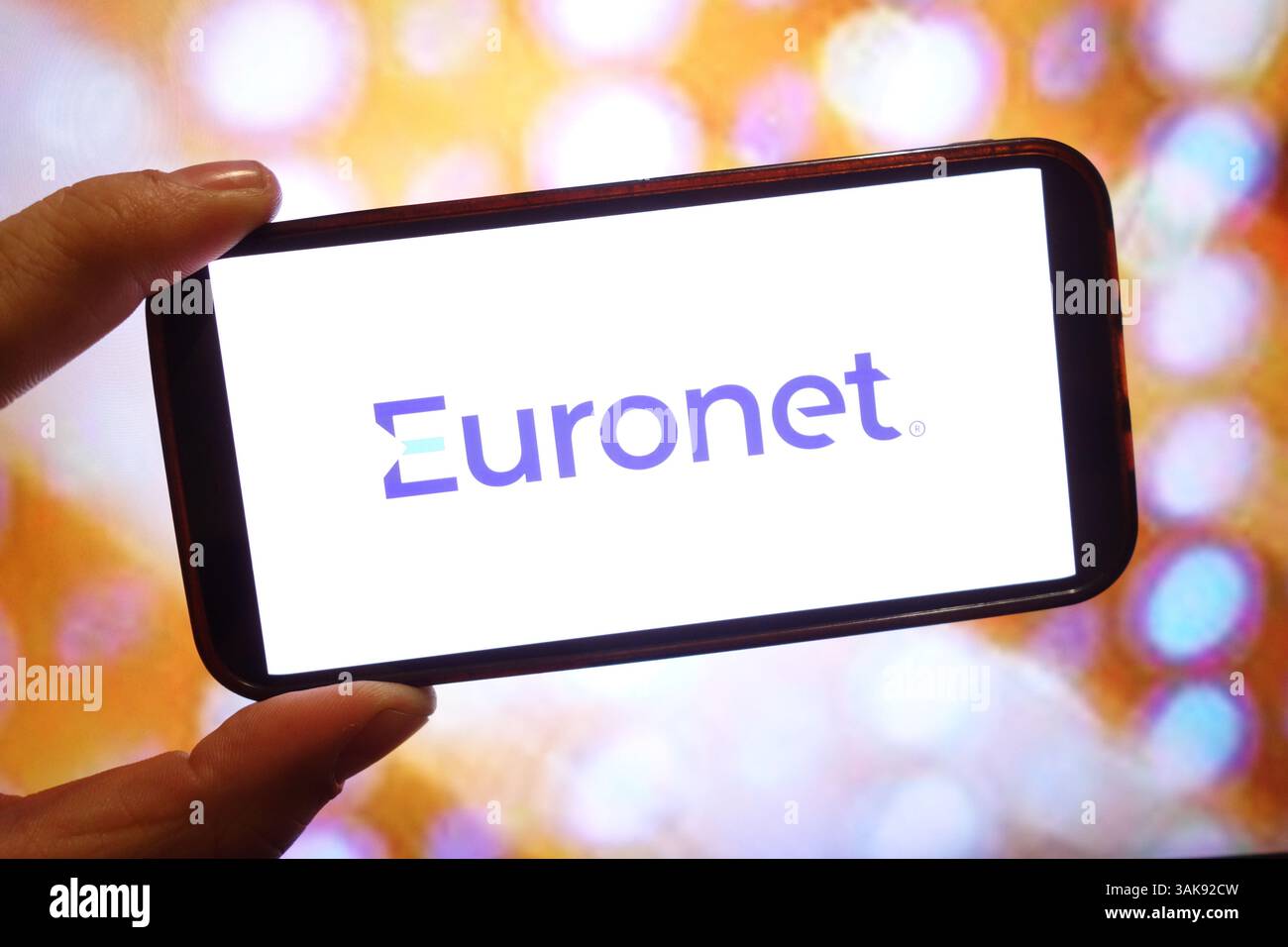 In this photo illustration, the Euronet Worldwide company logo is seen ...